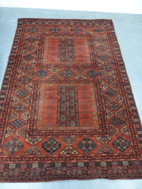 A large red ground Louis de Poortere 'Mossoul' pure wool rug / carpet ...