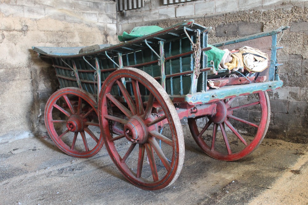 AN EARLY 19TH CENTURY VINTAGE HAY CART / FARM WAGON, the wooden body ...