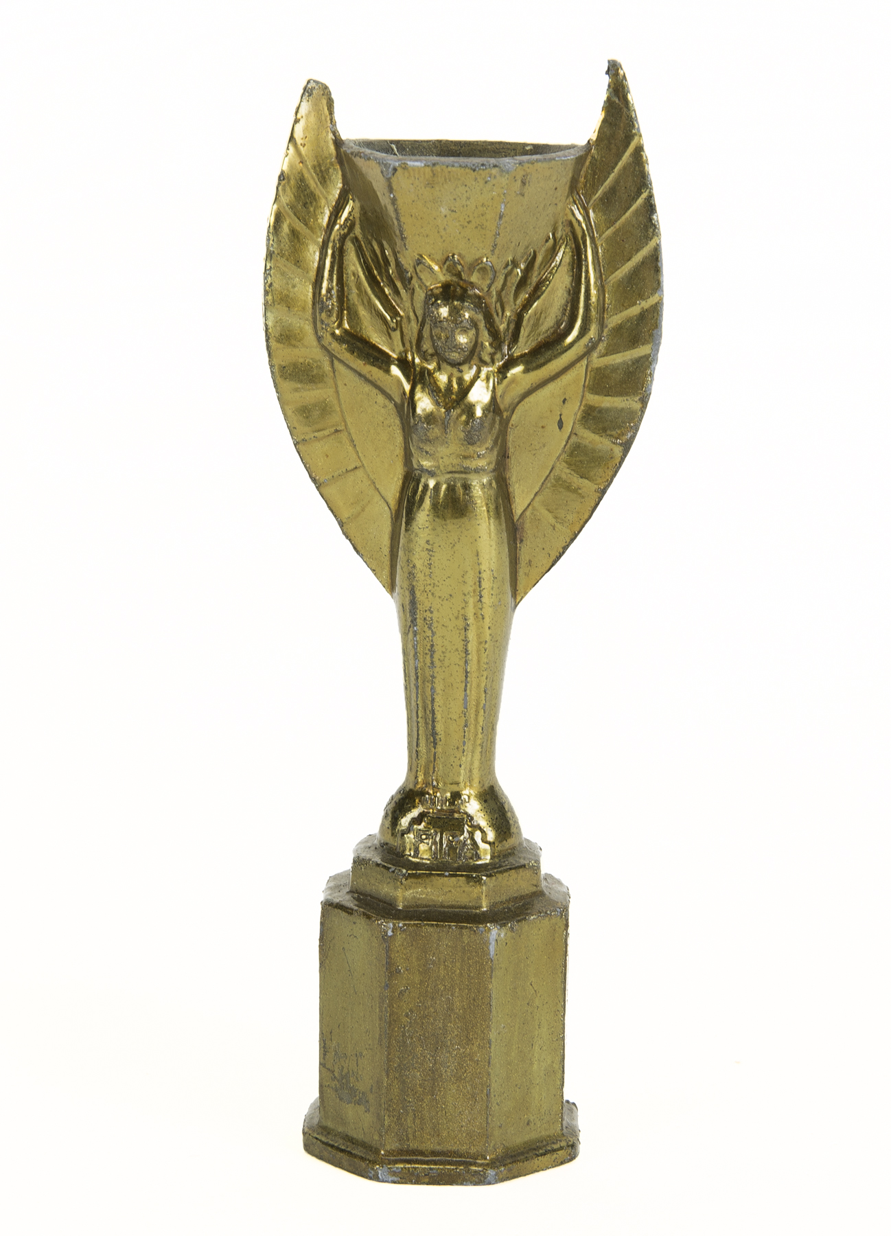 A miniature metal version of the Jules Rimet Trophy presented to Pelé ...