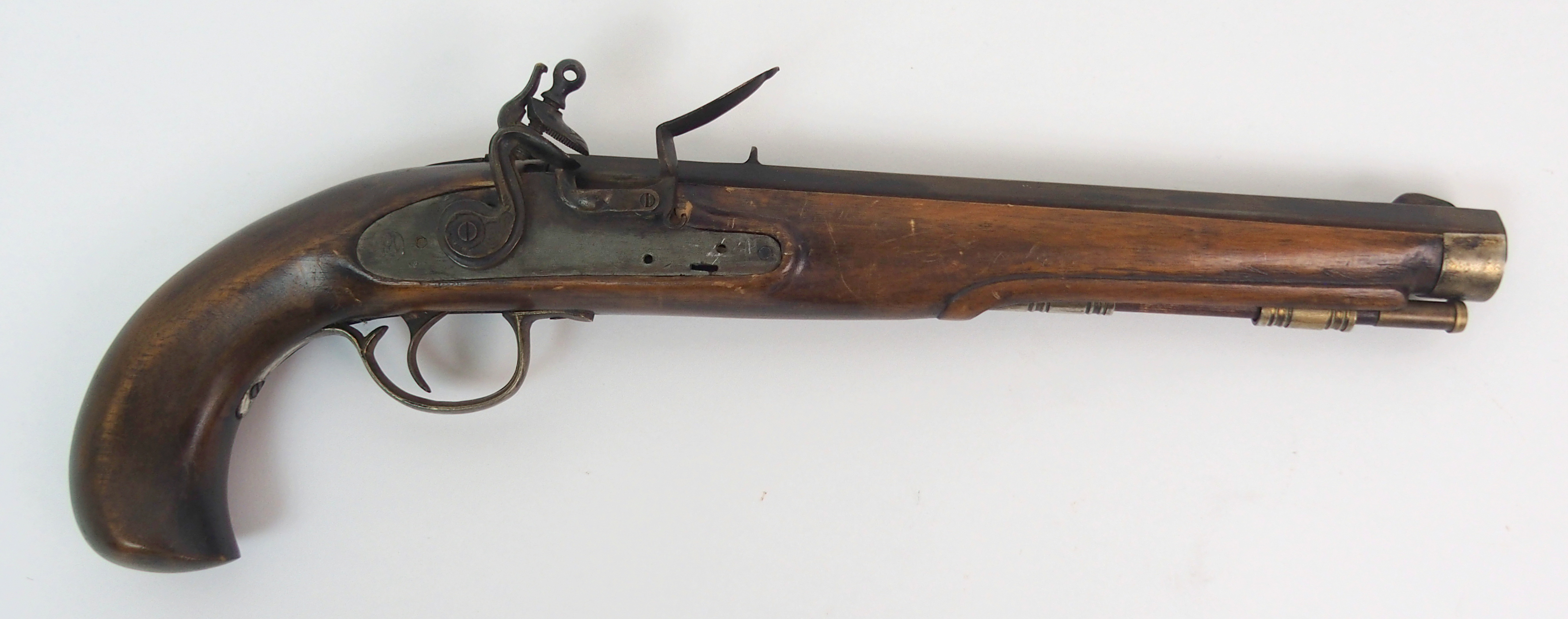 *WITHDRAWN* A 19TH CENTURY FLINTLOCK PISTOL with ramrod, the steel ...