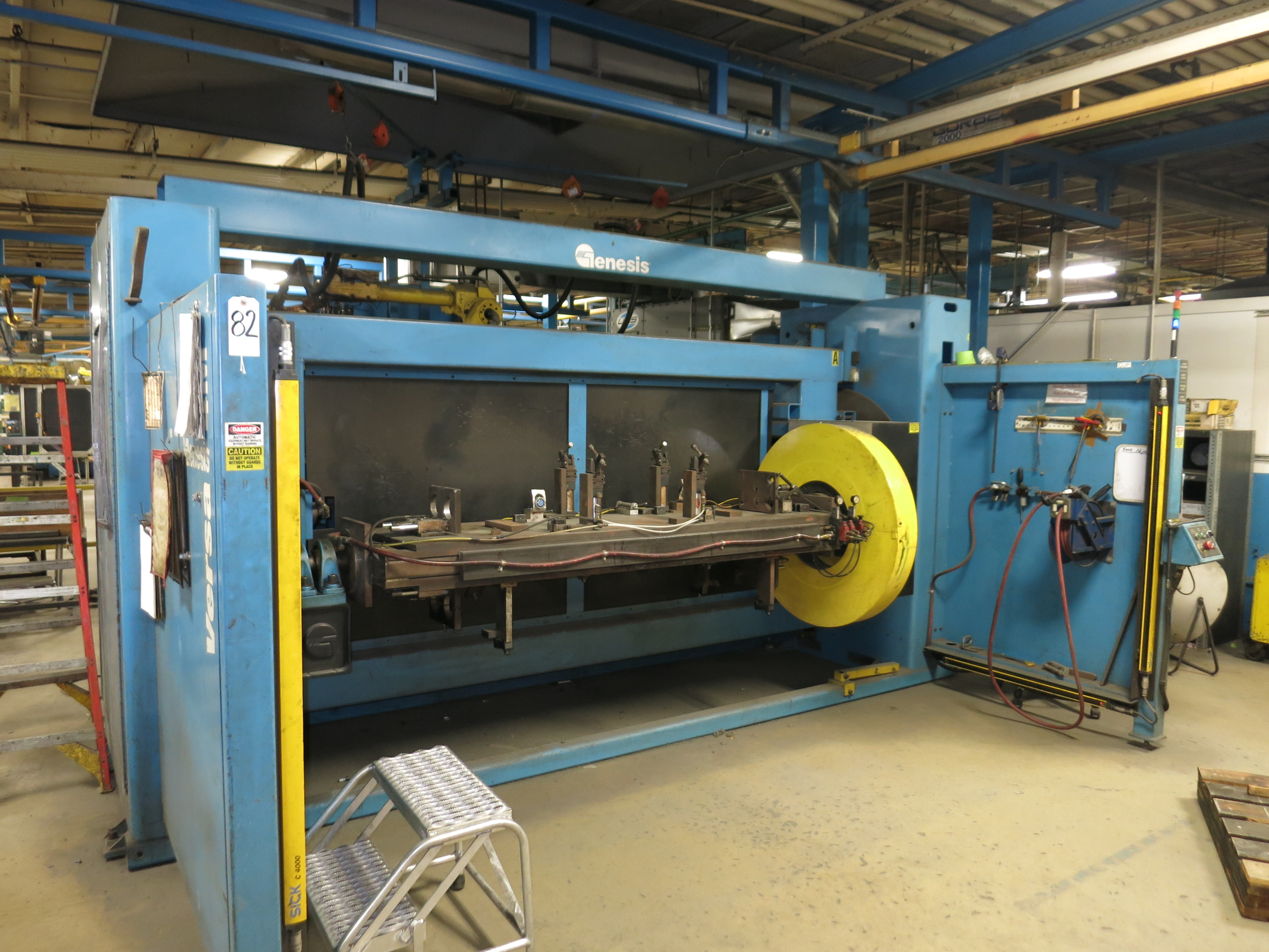 Genesis robotic trunnion welding cell featuring Fanuc robotics; robot ...