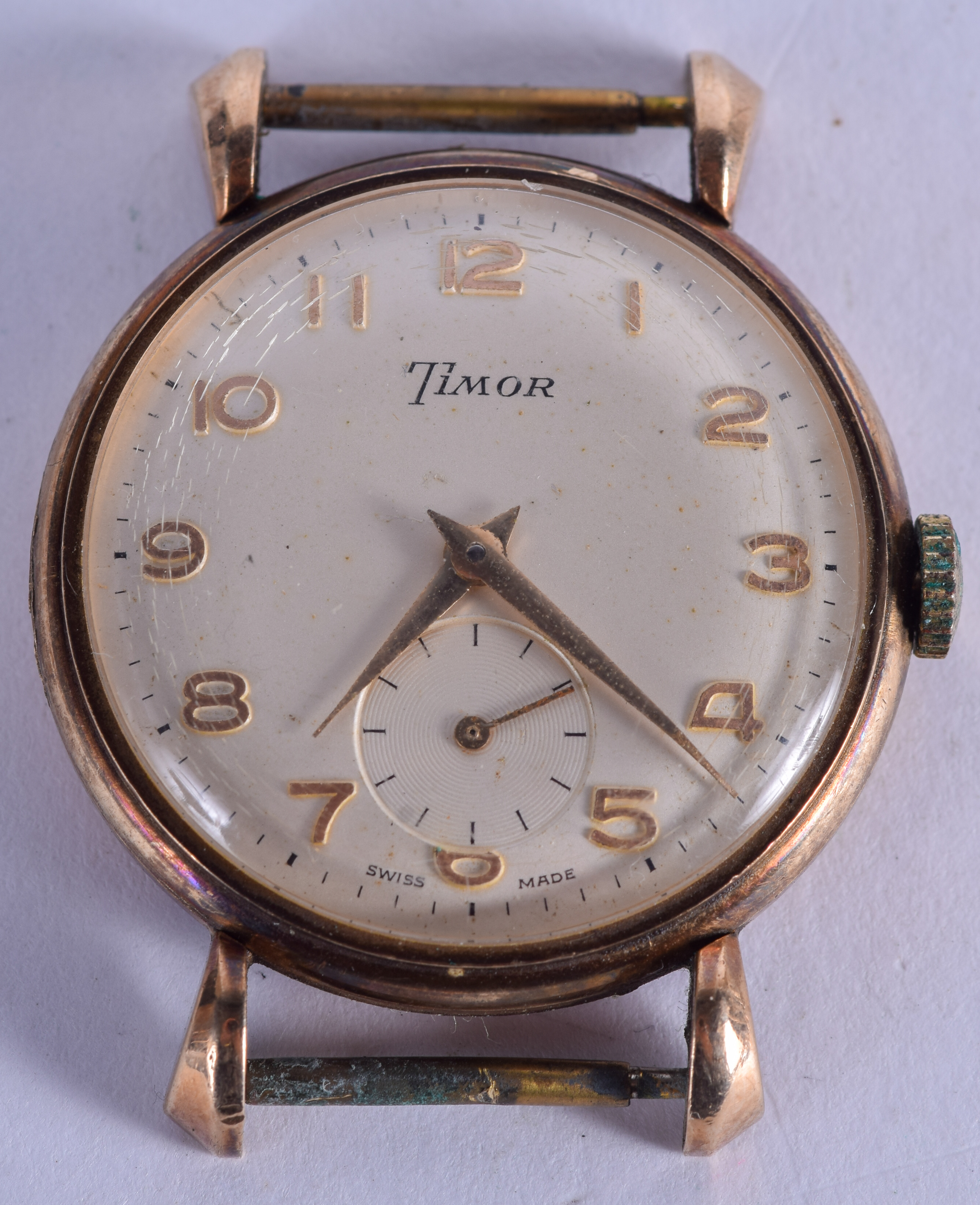 A VINTAGE 9CT GOLD TIMOR WATCH. 26.7 grams. 3 cm diameter.