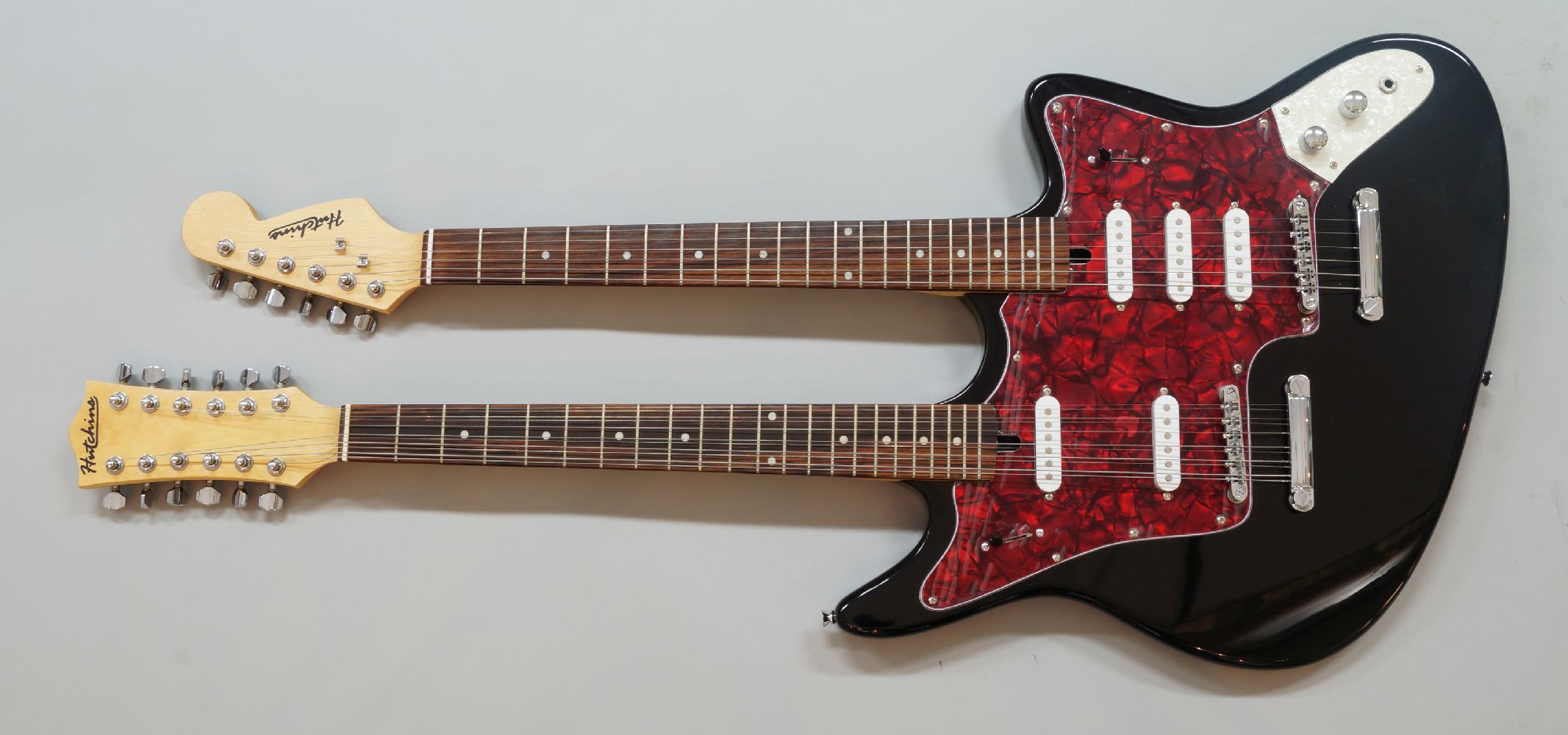 A Hutchins double neck electric guitar, with 6 and 12 strings, each ...