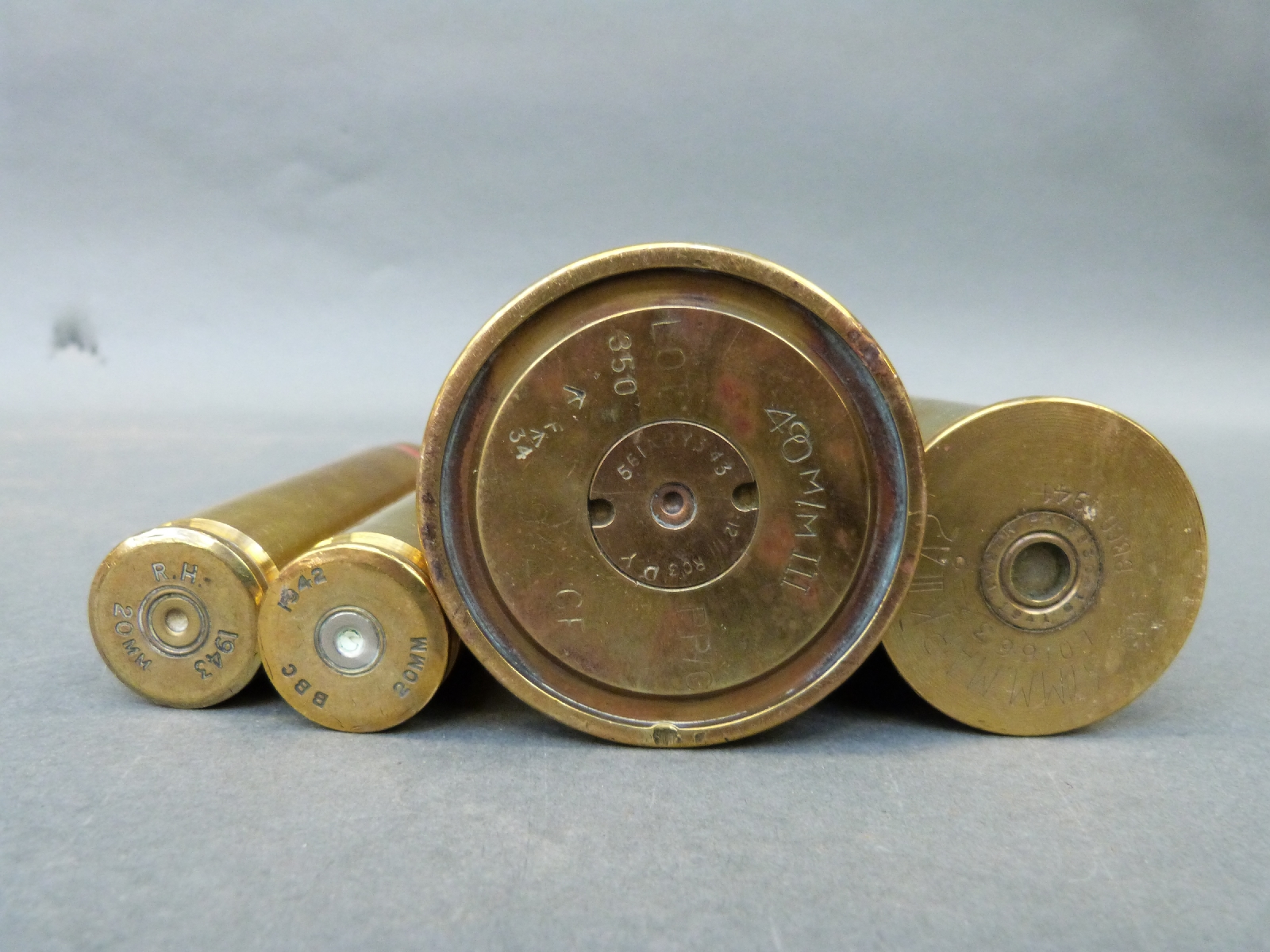 Eight WWII and later brass shell cases, largest marked 18Pr, two marked ...