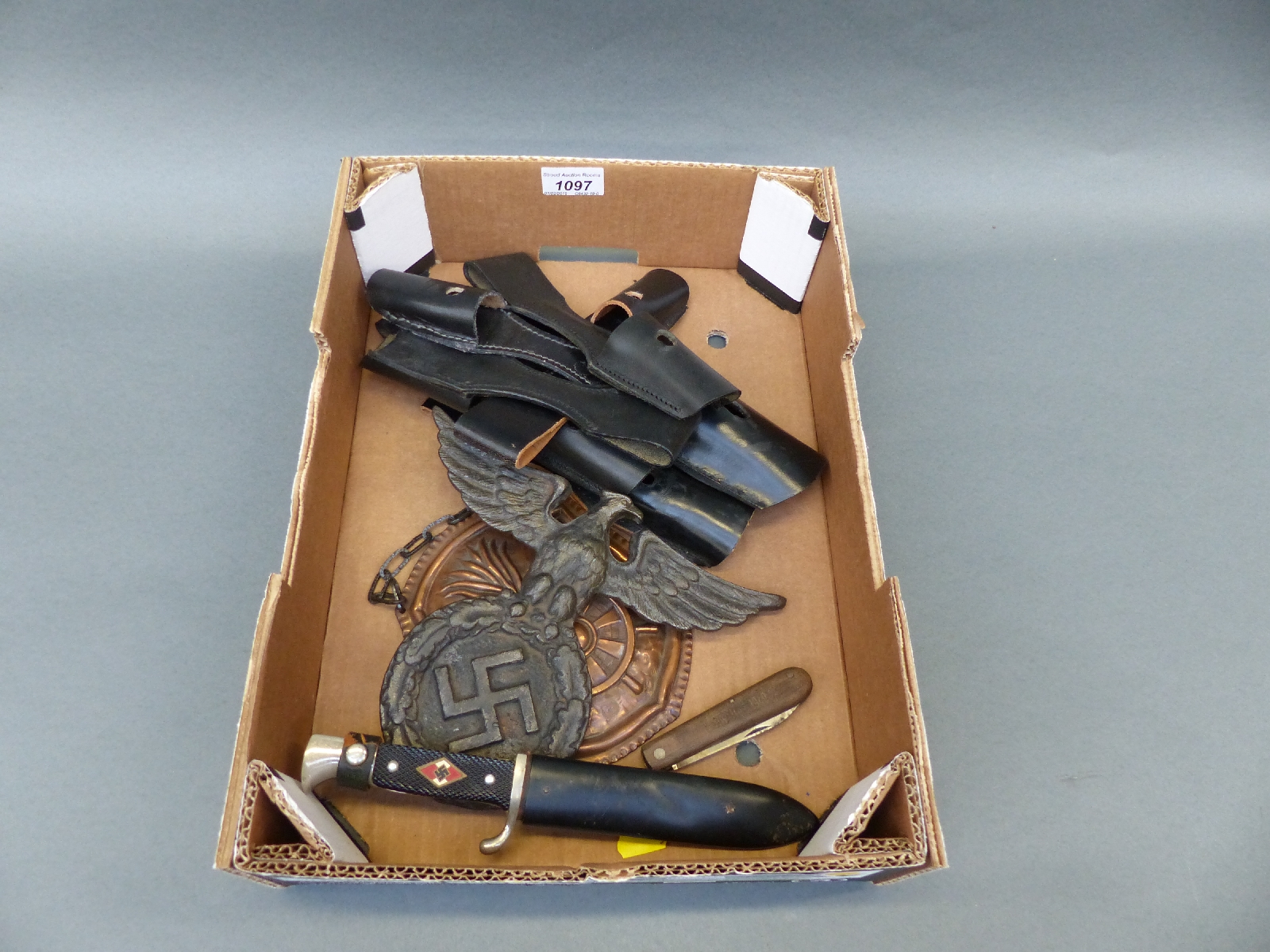 A quantity of Nazi German reproduction insignia including Hitler Youth ...