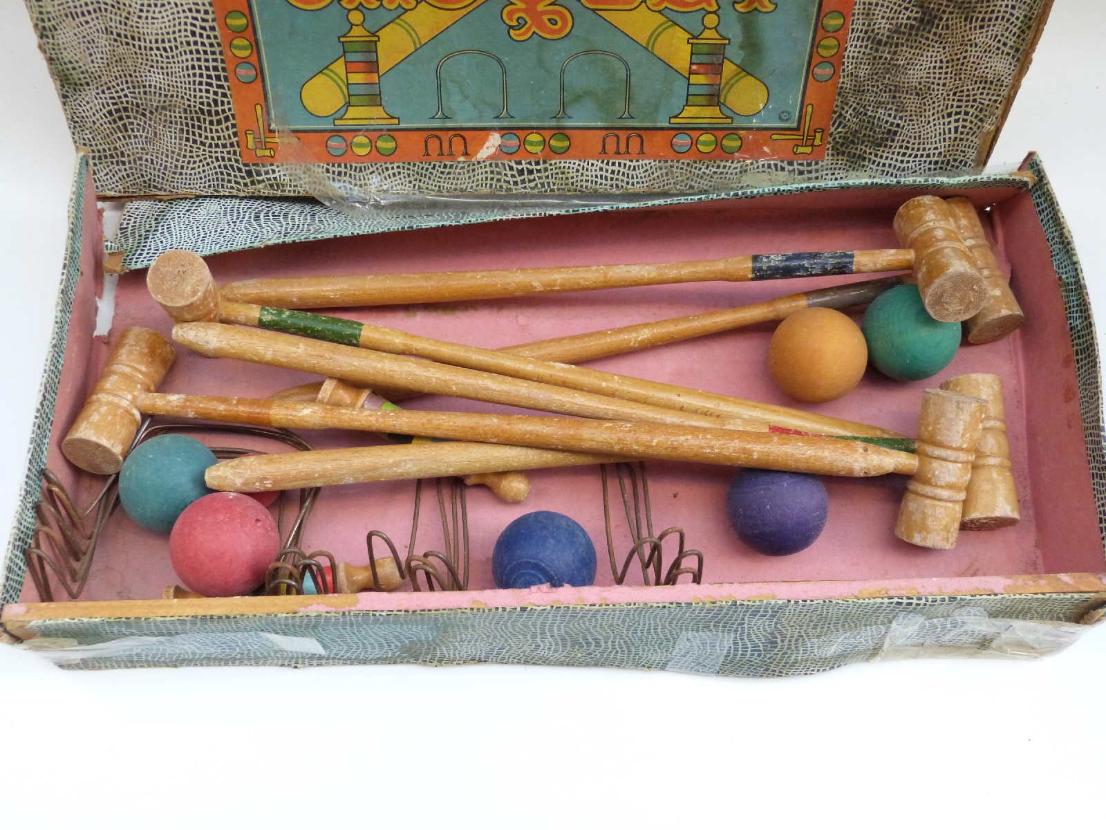 A vintage miniature wooden croquet set in original box together with ...