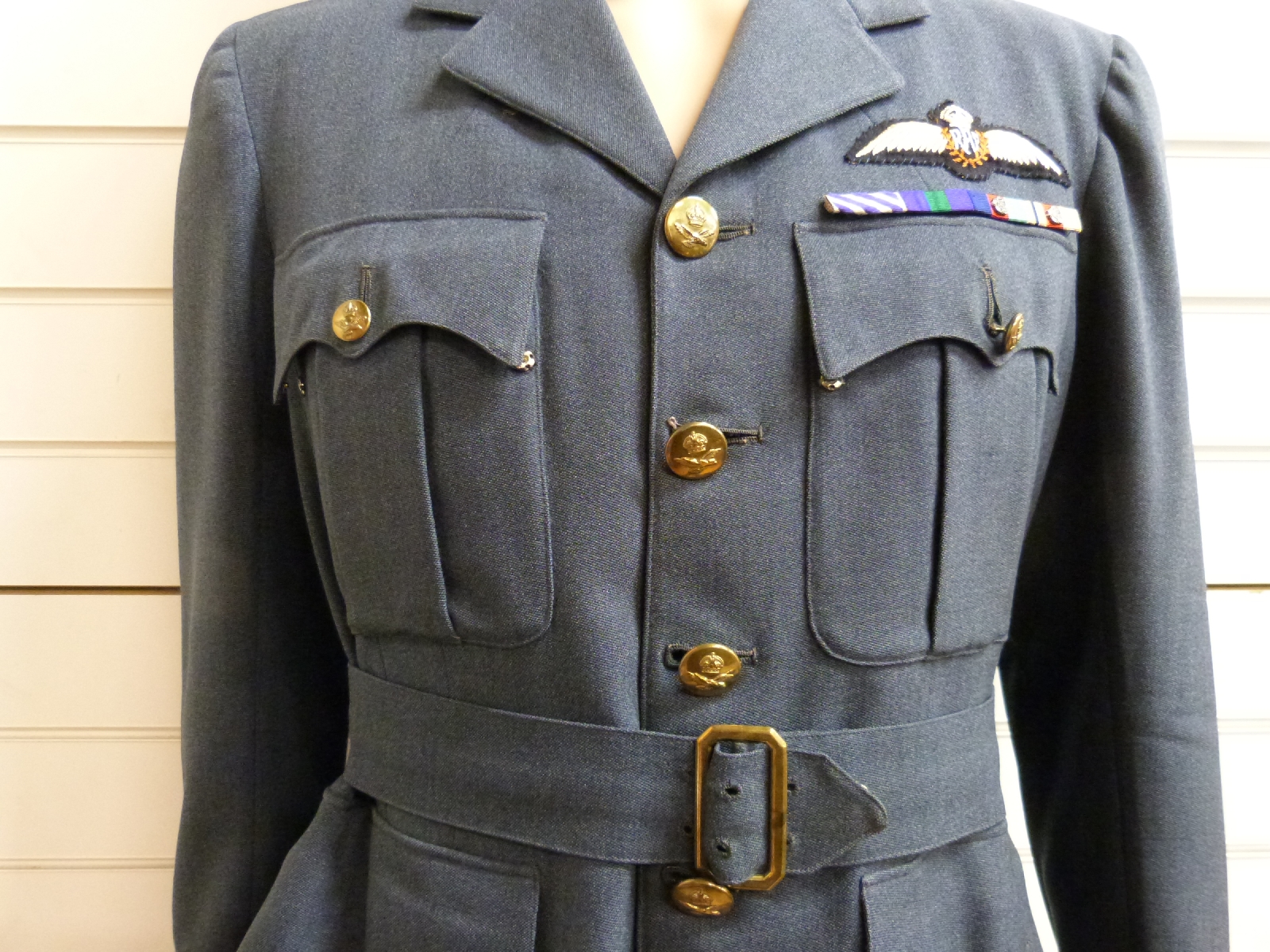 Two RAF officer's uniforms with badges of rank and medal ribbons both ...