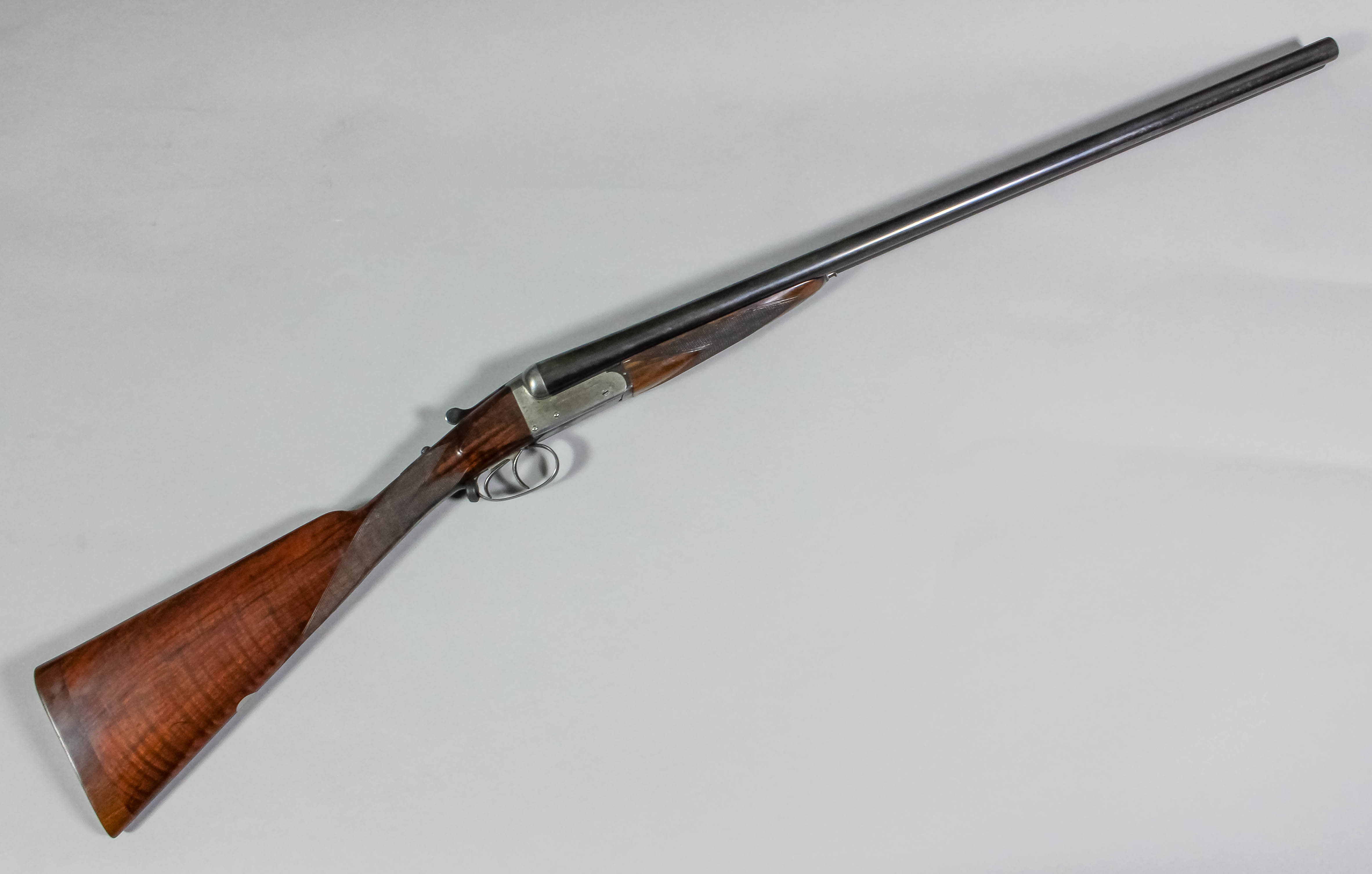 A 12 bore side by side shotgun by William Powell & Son, Serial No ...