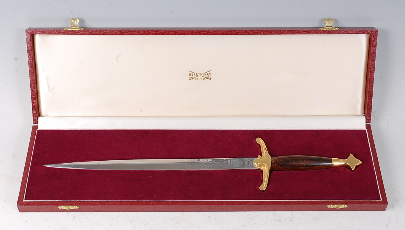 A Wilkinson Sword presentation dagger, the 28cm blade etched By ...