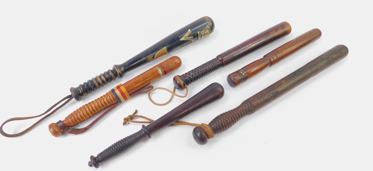 A group of six wooden truncheons, late 19thC and later, including an ...