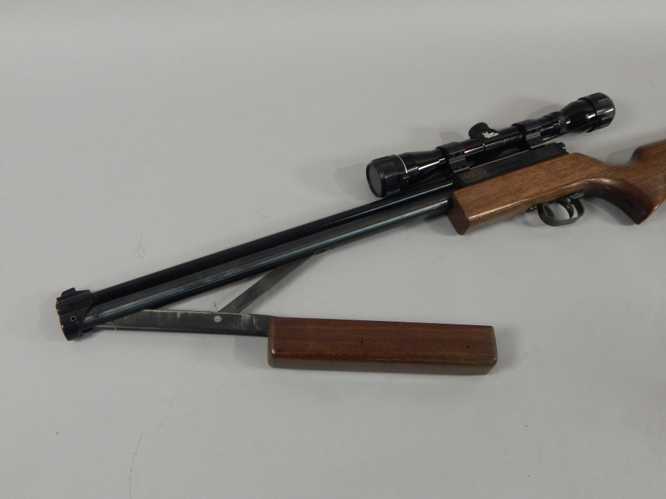 A Sharp Innova II air rifle, made in Japan with silver antler sight ...