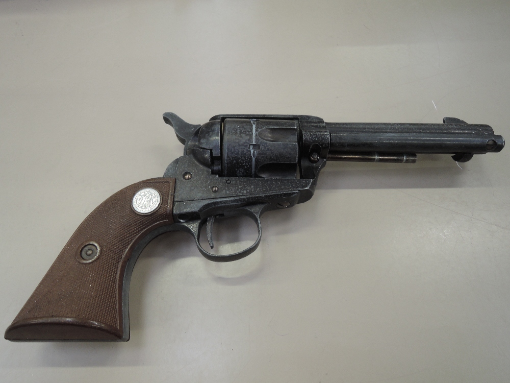 A blank firing Colt 45 replica Revolver, empty shells and superb hand ...