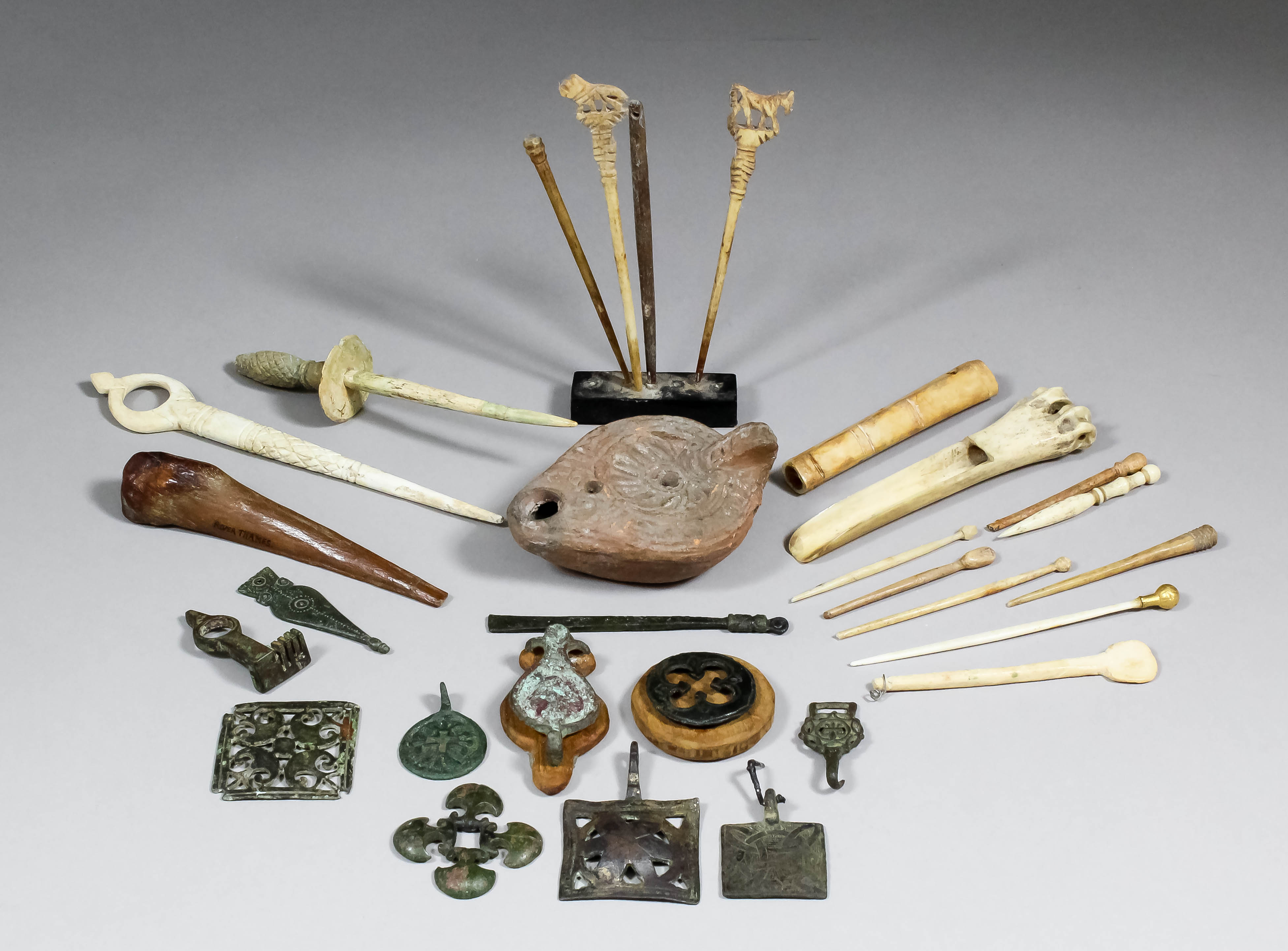 A small collection of Post Roman objects, including - Pottery oil lamp ...