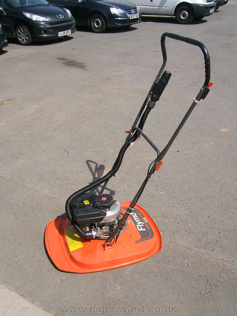 A "Flymo Contractor GT2" Hover Mower with 2 stroke petrol engine.