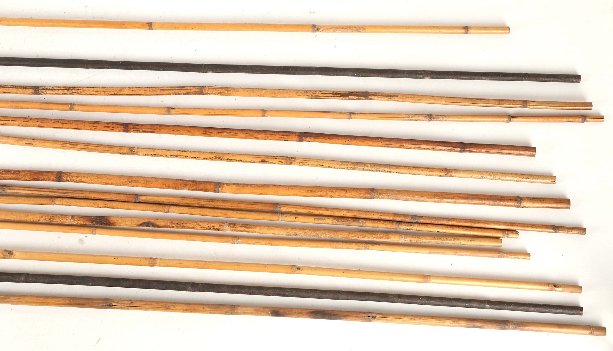 FOURTEEN BAMBOO SPEARS, PAPUA NEW GUINEA Including barbed spears and ...