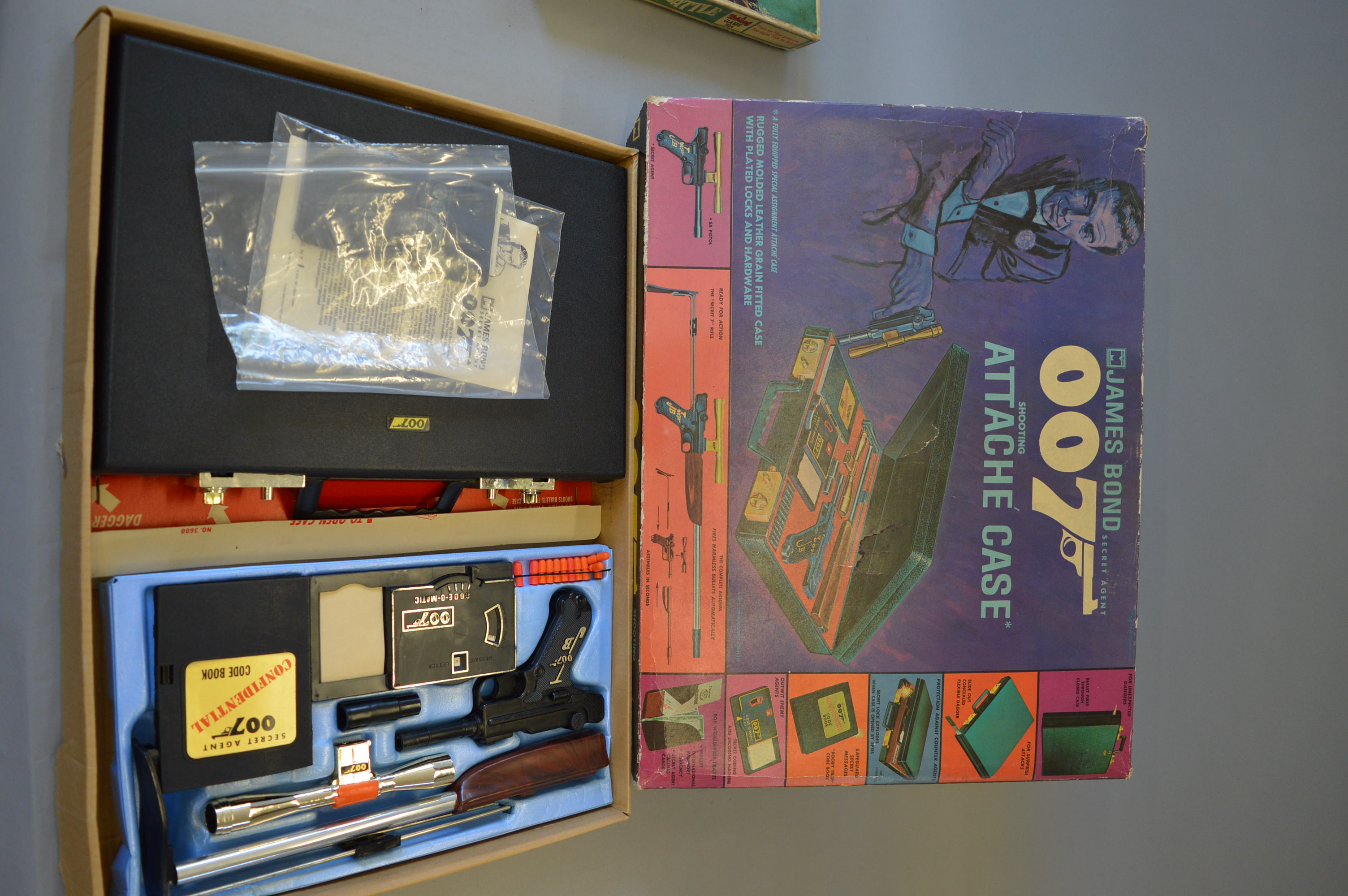 A boxed James Bond 007 Secret Agent 'Shooting Attache Case' by Multiple ...