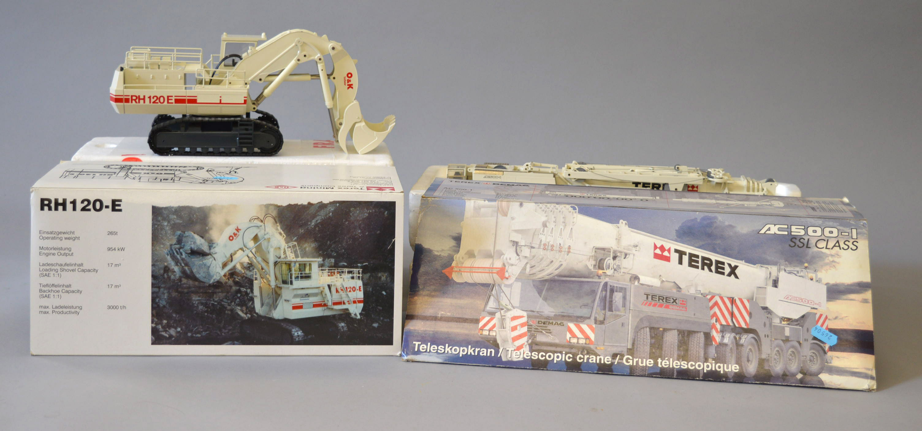 Two Conrad Terex 1:50 scale diecast models: 2771/02 O&K RH120-E; 2098/0 ...