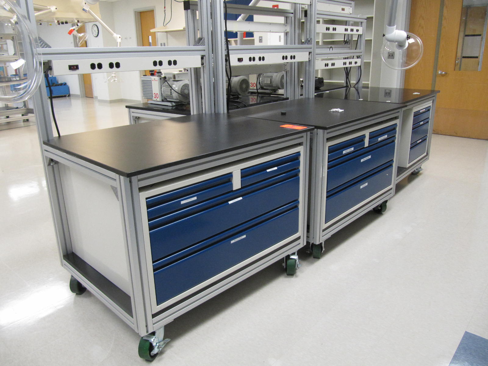 Lot of (5) mobile lab counters, approximate 48" X 36", with drawers and ...