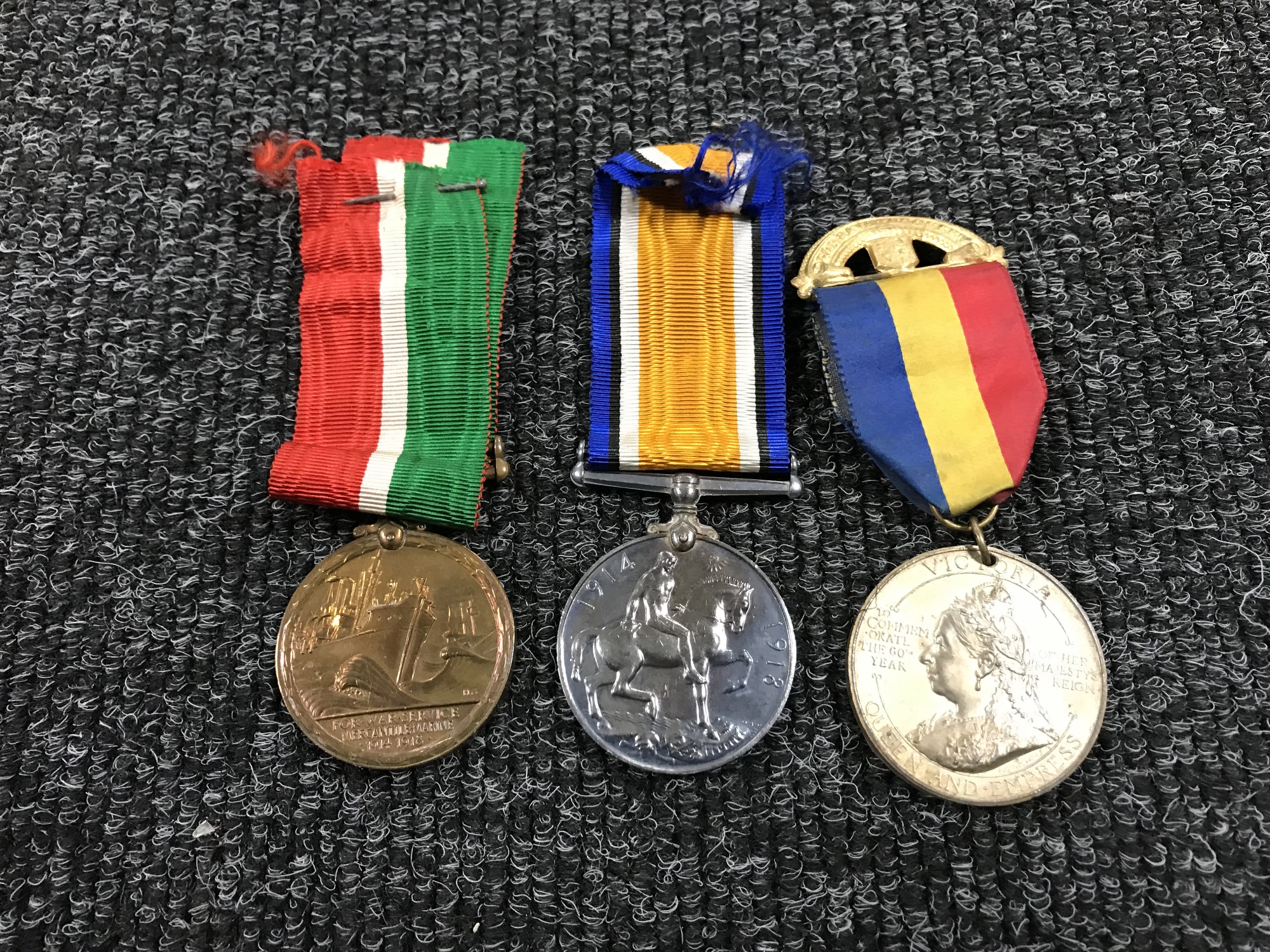 Two WWI medals with ribbons, together with a Victoria Queen and Empress ...