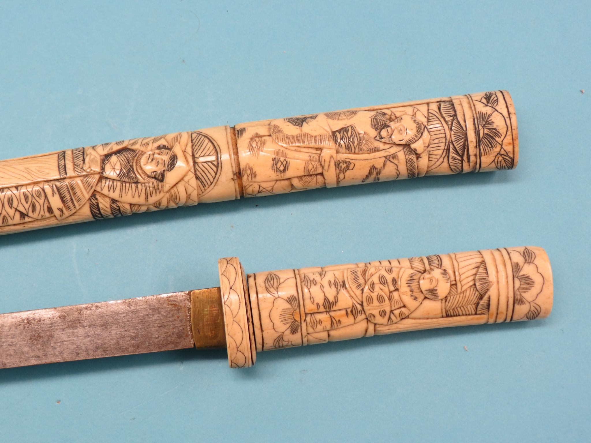 A 19th century Chinese bone dagger, 8in. curved, single-edged blade ...