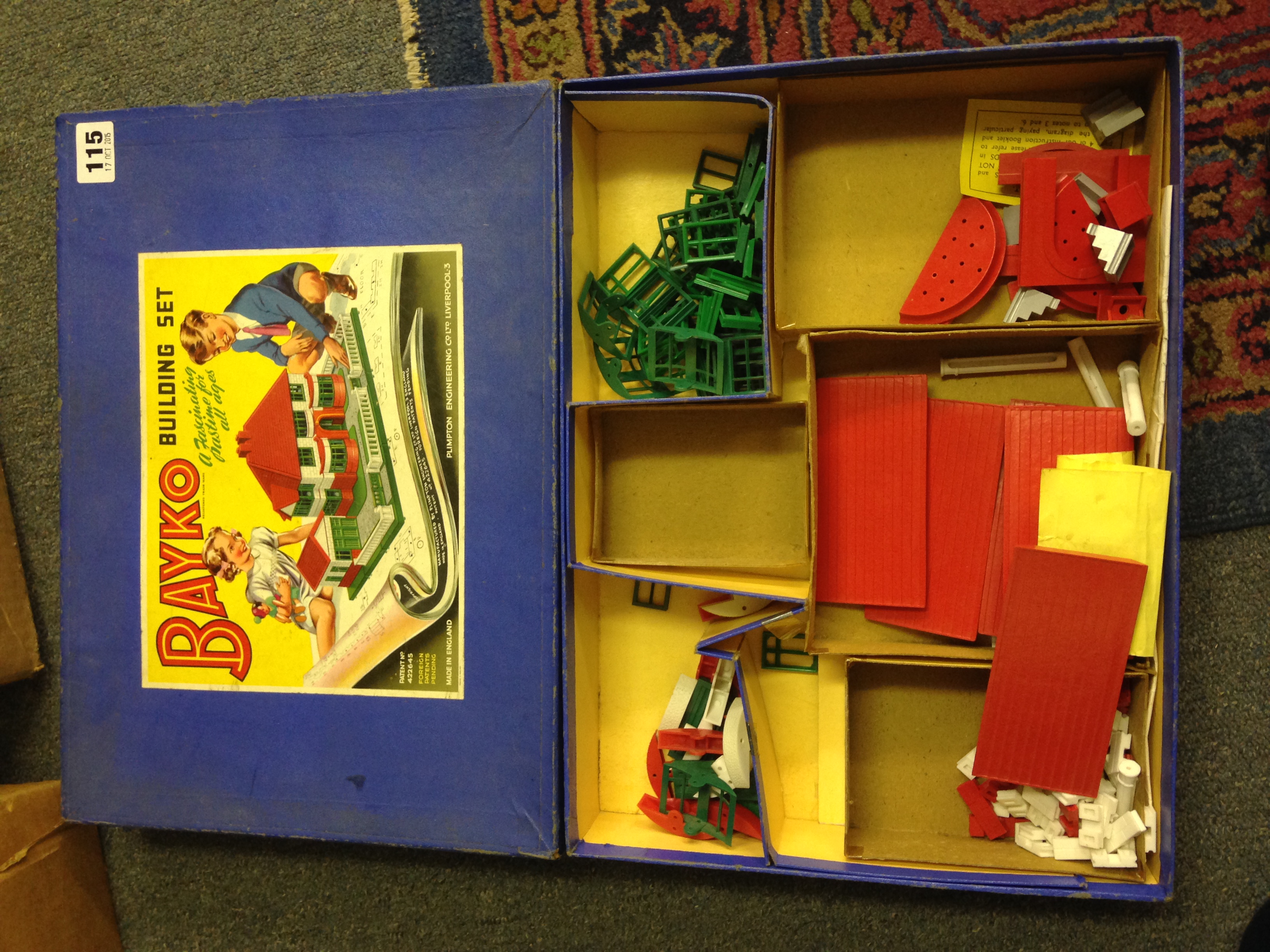 A large collection of Bayko building accessories contained in six Bayko ...