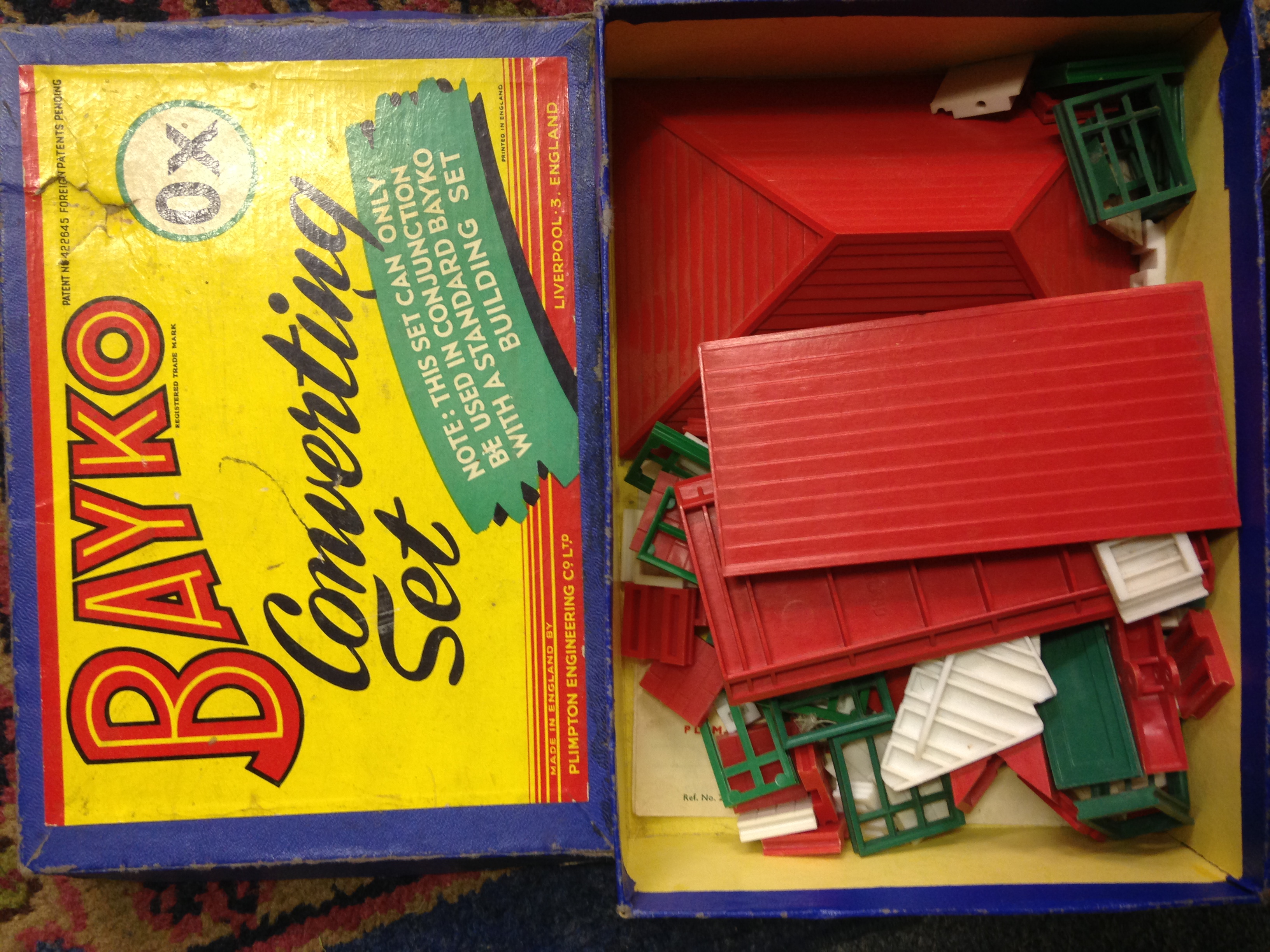 A large collection of Bayko building accessories contained in six Bayko ...