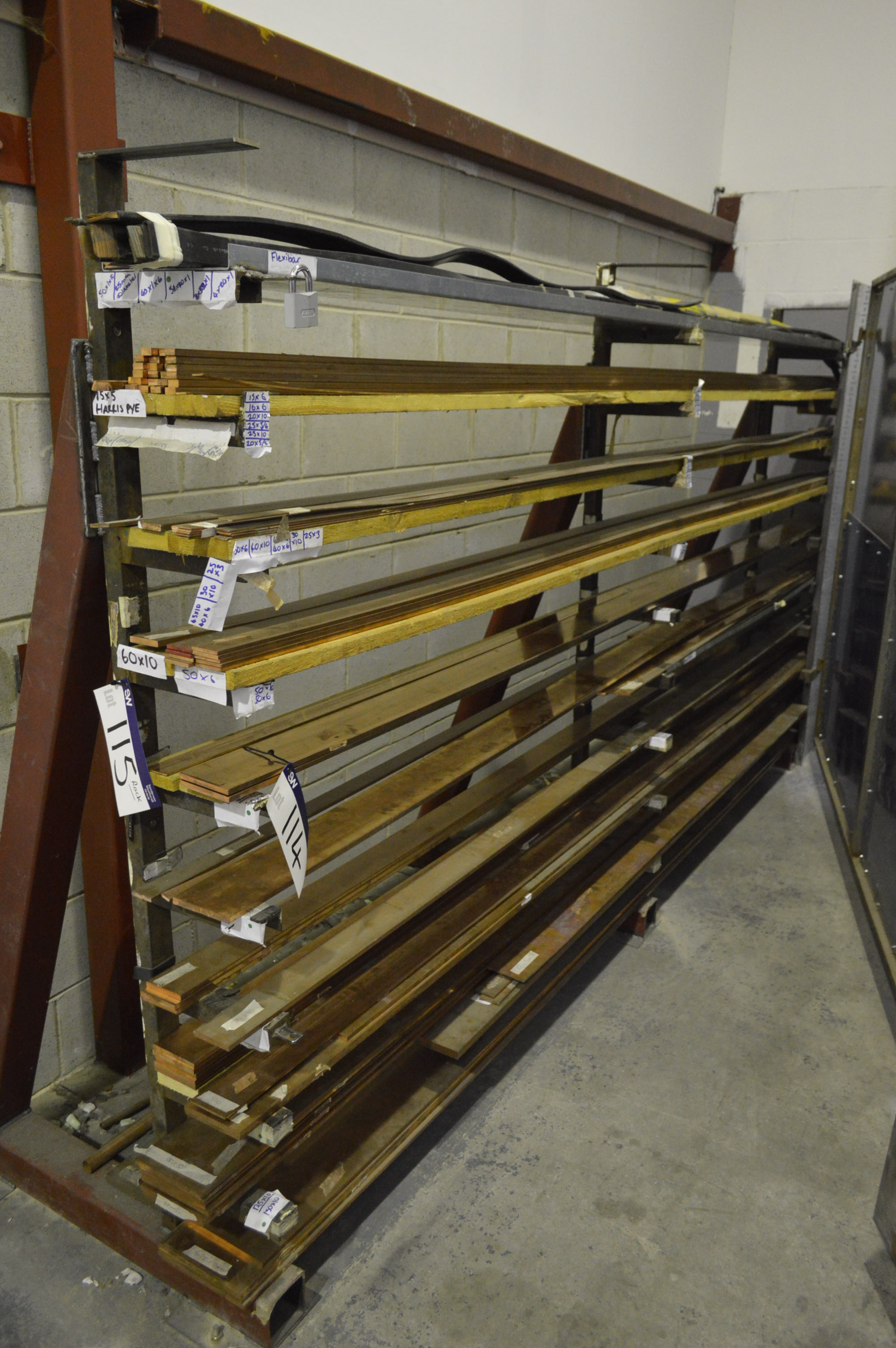 STOCK OF COPPER BUS BAR, on rack, varying thicknesses, widths and lengths