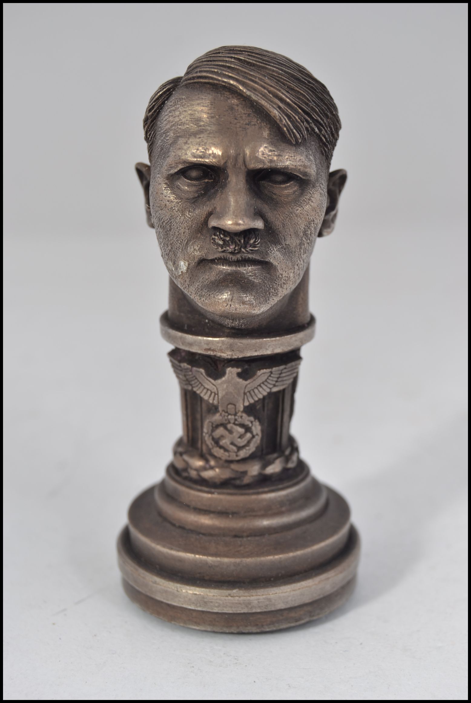 A well made unusual bronze ' Hitler ' seal. The bust of hitler atop ...