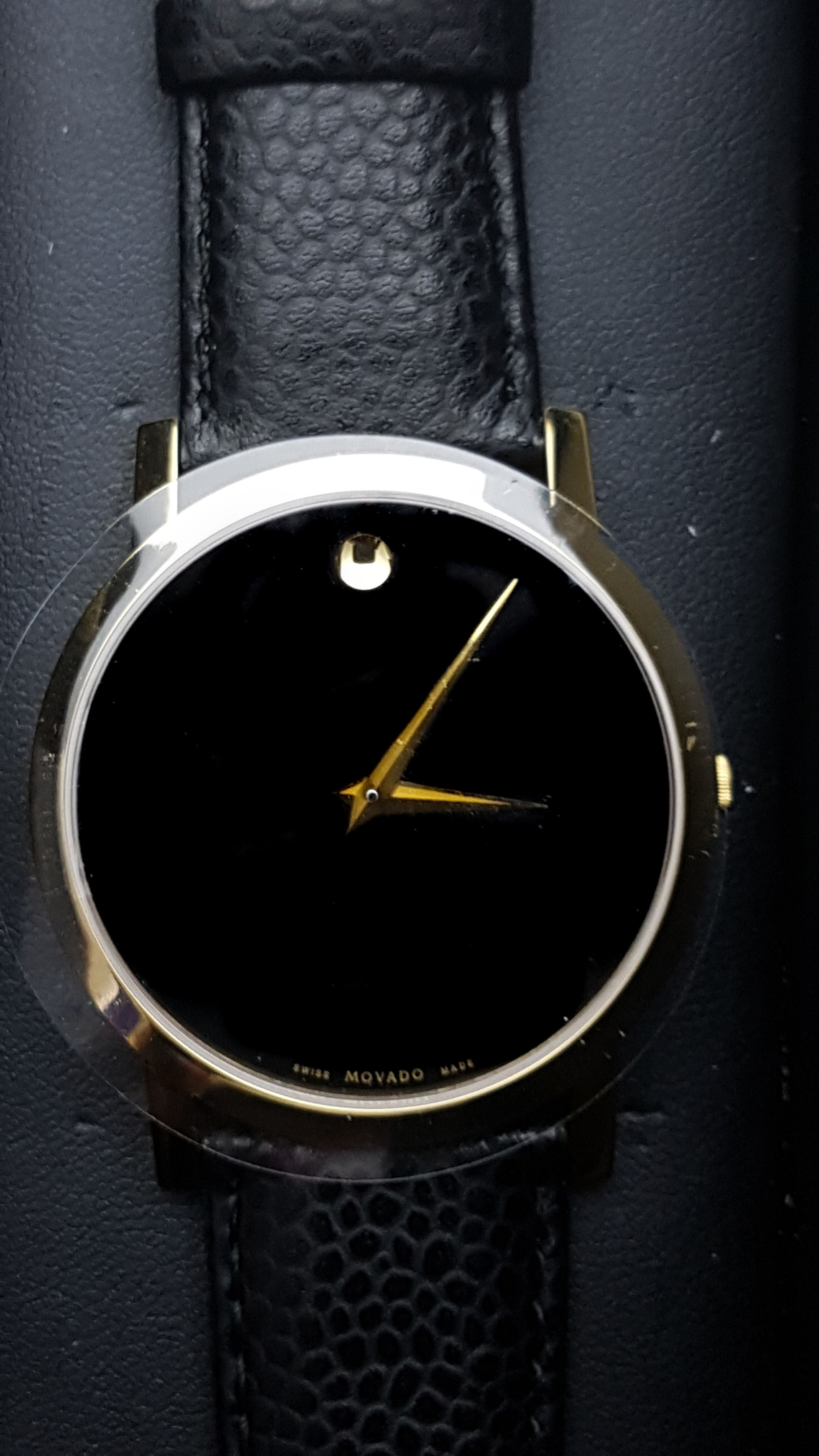 A Movado Museum gentleman's wristwatch, model number 88 G1 1855, unworn ...