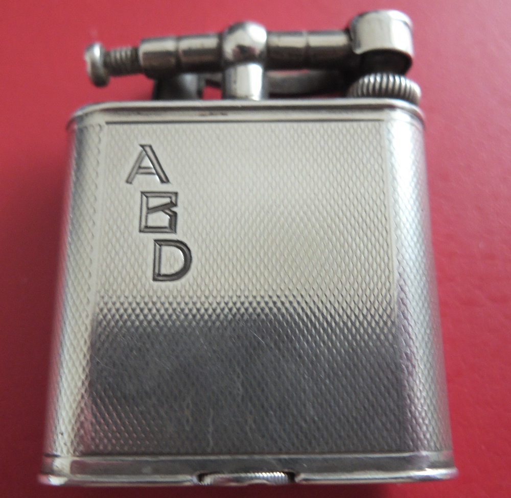 Vintage Silver Dunhill Lighter with London Hallmarks - 52mm x 42mm.The ...