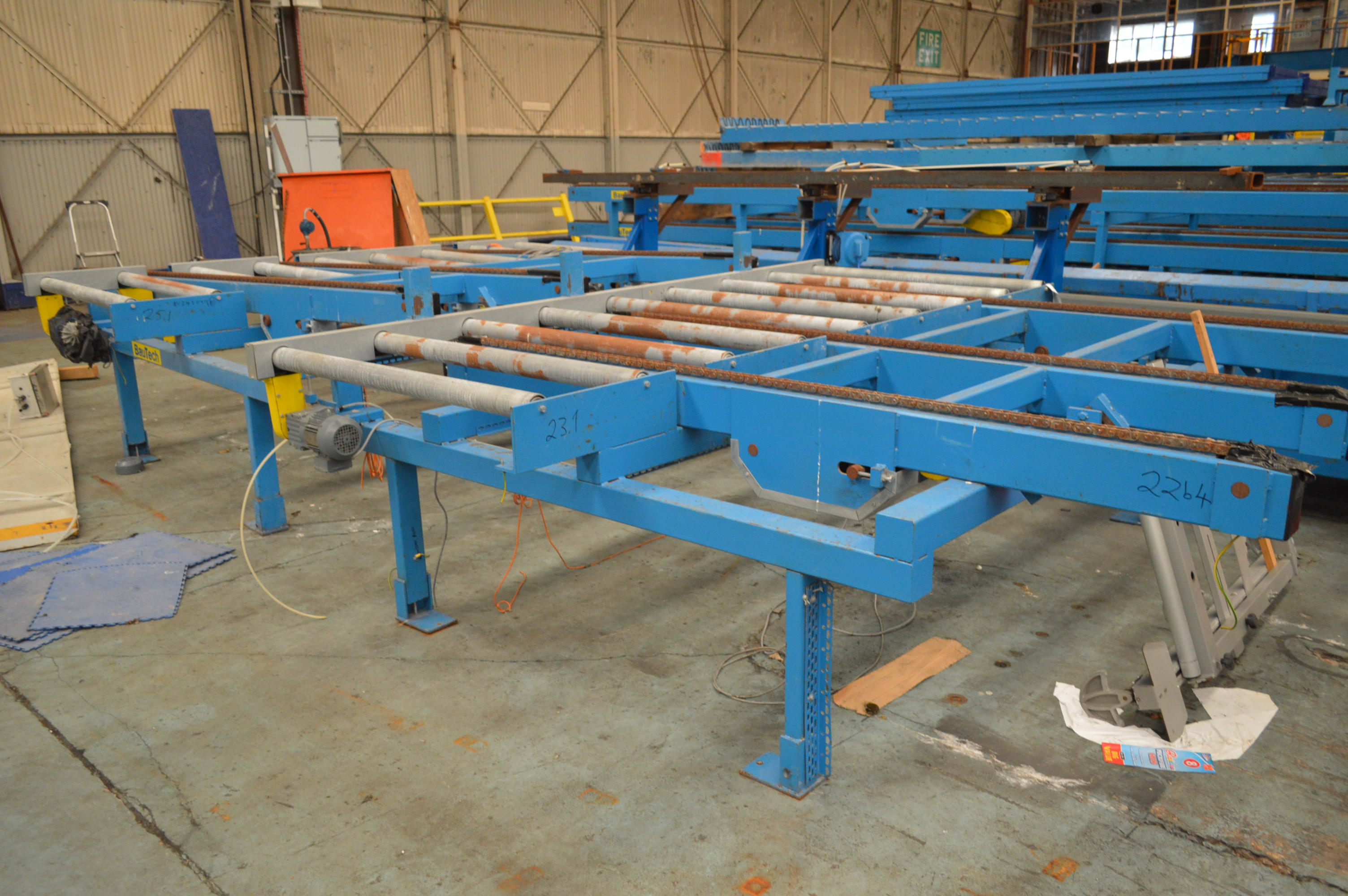 Two BauTech Cross Conveyors, each with powered roller conveyor, 1.33m ...