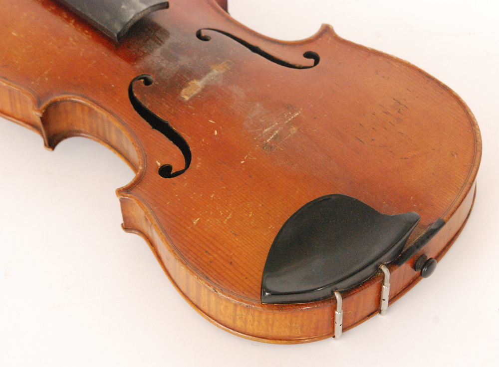 An early 20th Century violin with a spruce soundboard and with a two ...
