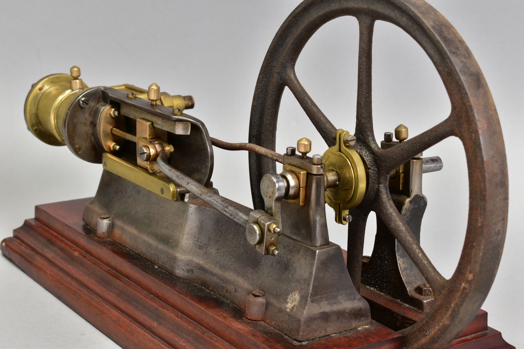 A HORIZONTAL SINGLE CYLINDER LIVE STEAM ENGINE, brass cylinder with ...