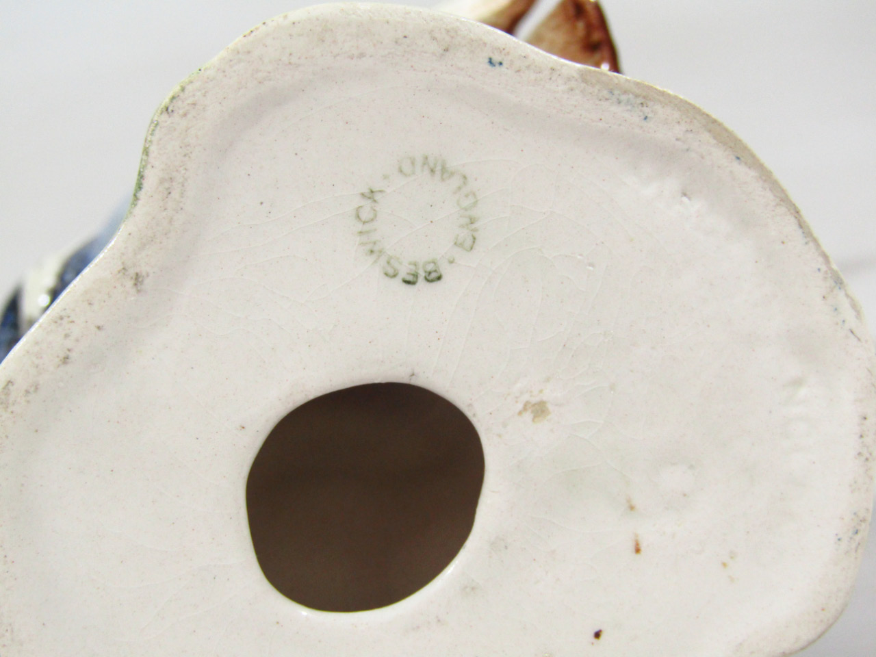 A Beswick pottery bird group, no. 9, impressed and printed marks ...