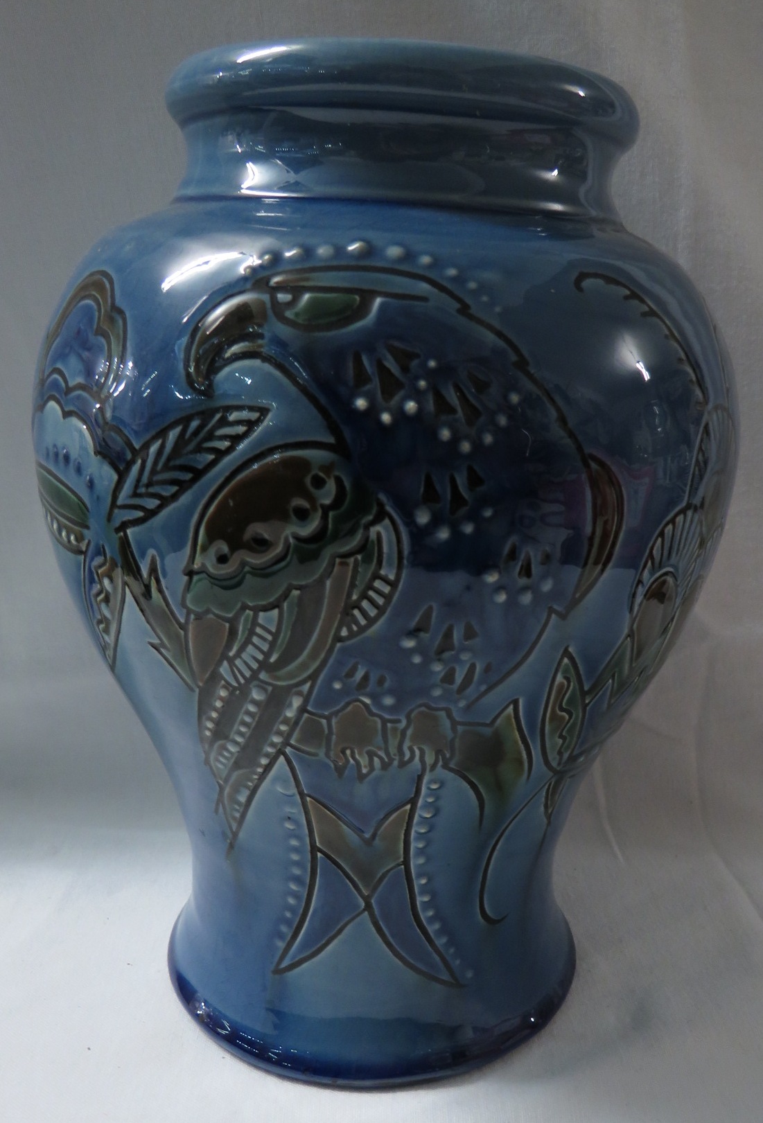 A C H Brannam pottery baluster vase, blue glaze decorated with eagle ...