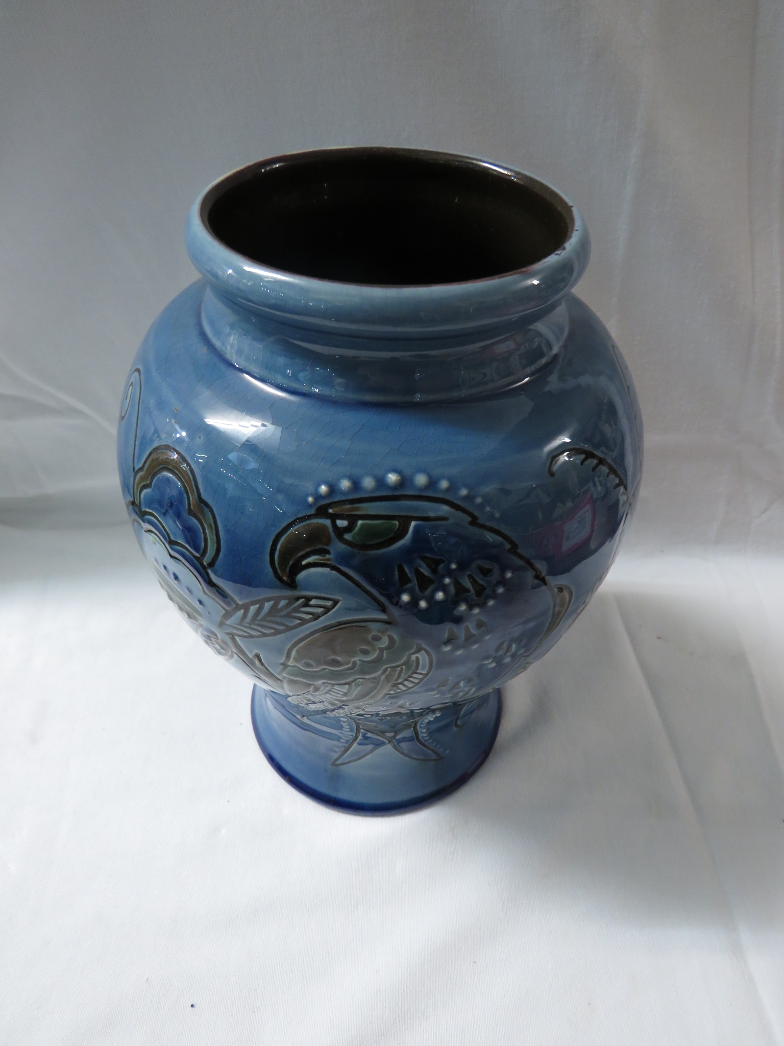 A C H Brannam pottery baluster vase, blue glaze decorated with eagle ...