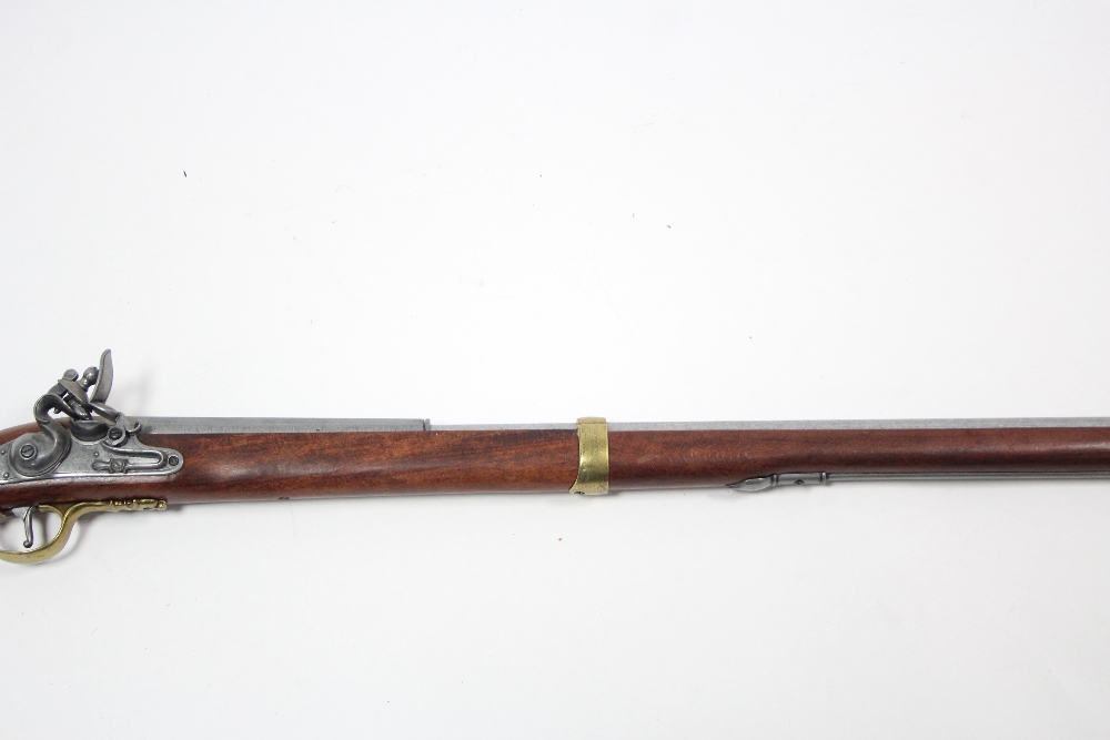 A 17th century-style flintlock musket & rifle bayonet, 58¾” long.
