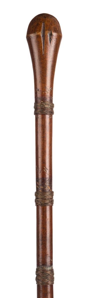*Zulu. 19th century Zulu stick, the wooden shaft bound in copper wire ...