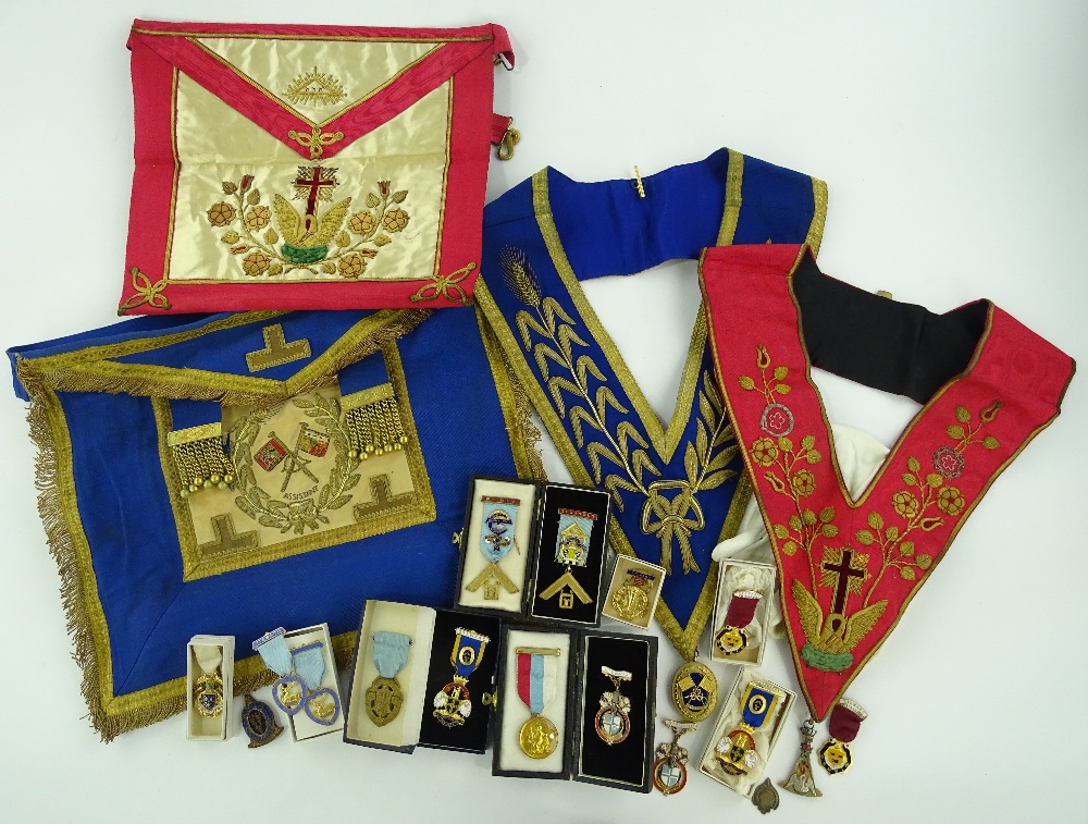 A quantity of Masonic regalia, including silver gilt medals, silk ...