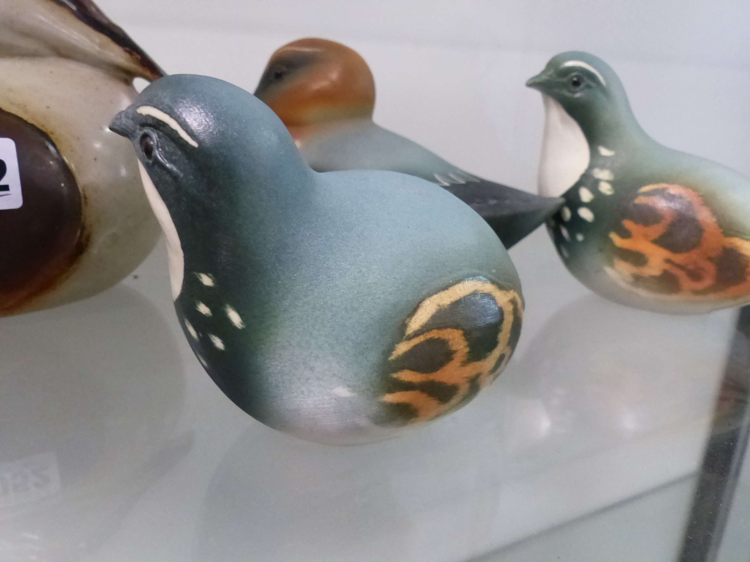 A GROUP OF FIVE HELMSDALE POTTERY FIGURES OF BIRDS, A PAIR OF GAME ...