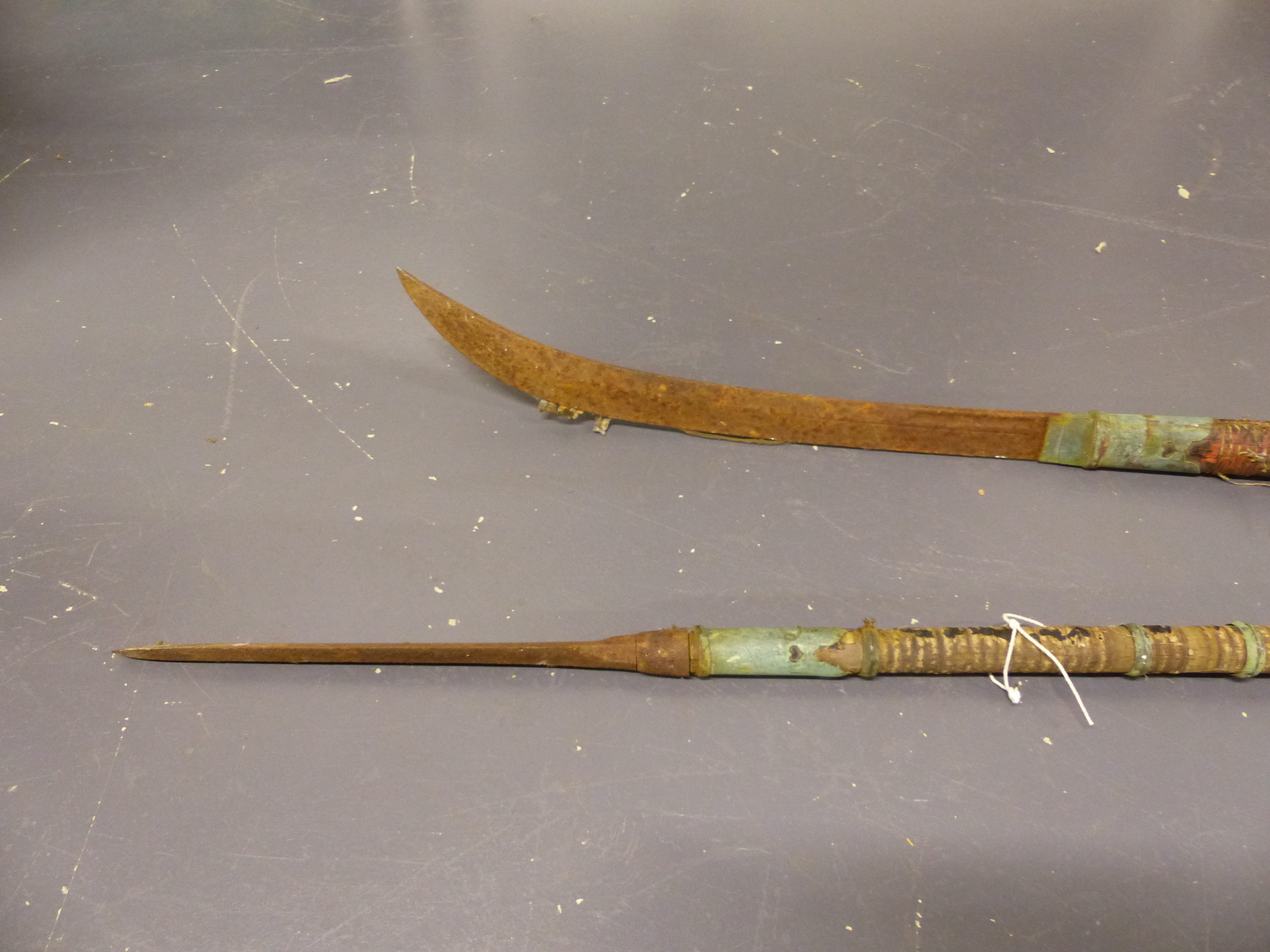 TWO JAPANESE POLEARMS, A NAGINATA WITH CURVED HEAVY TIPPED BLADE AND ...