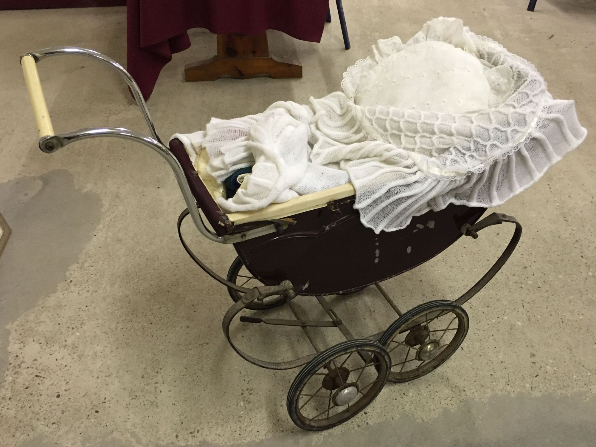 A vintage Leeway dolls pram.