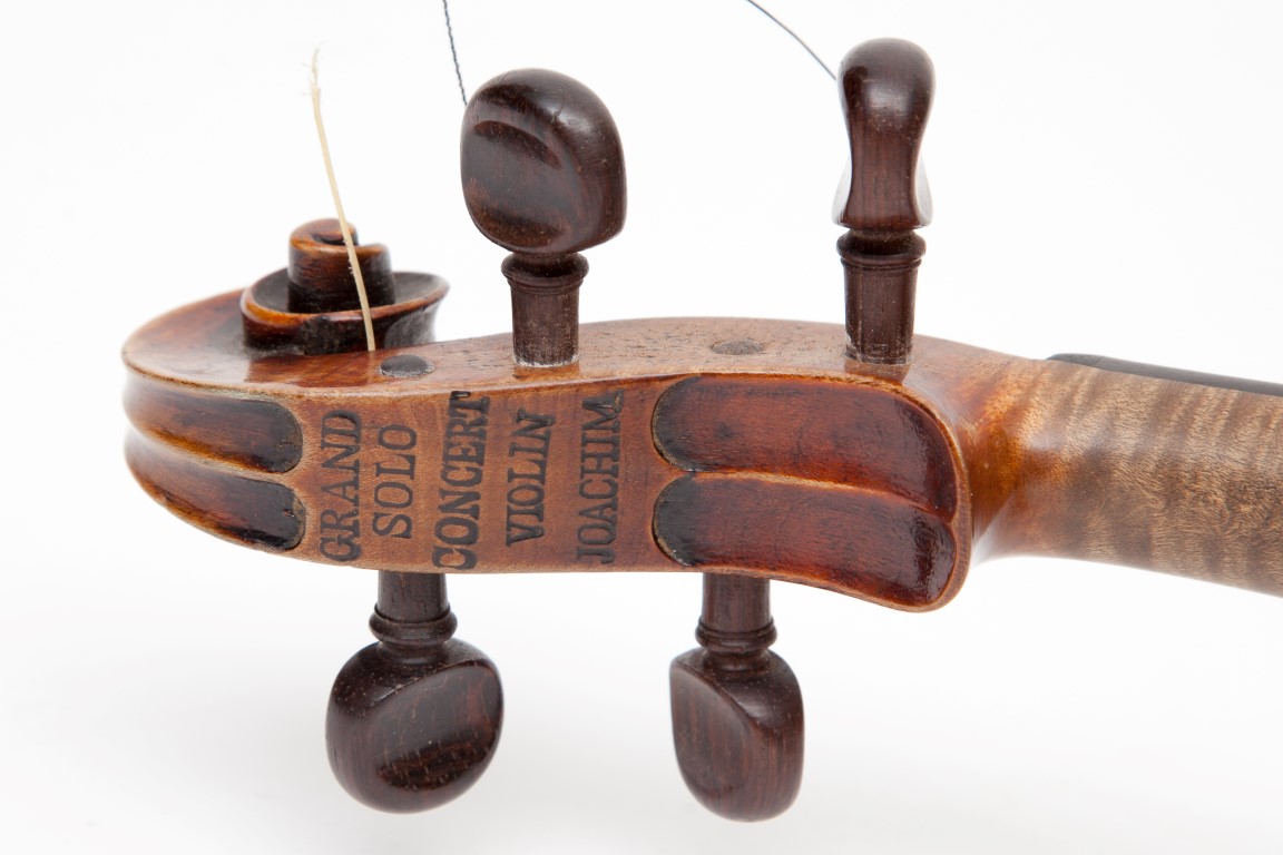 A FINE ANTIQUE VIOLIN, with two part back, the nicely carved scroll ...