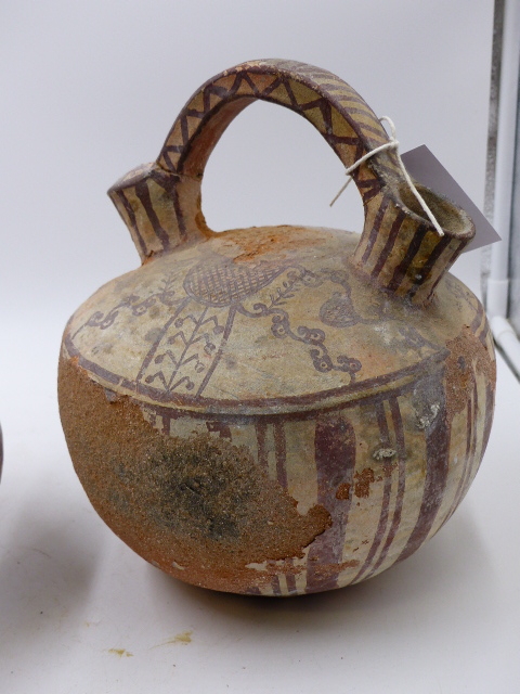 TWO ANCIENT MIDDLE EASTERN POTTERY VESSELS WITH GEOMETRIC DECORATION.