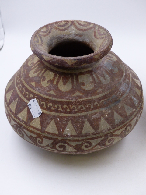 TWO ANCIENT MIDDLE EASTERN POTTERY VESSELS WITH GEOMETRIC DECORATION.