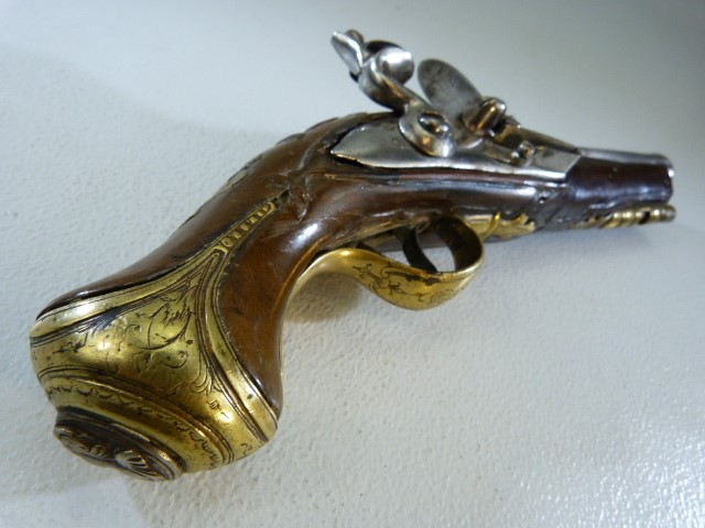 Flintlock Pistol: A slightly flared cannon barrel Flintlock pistol with ...