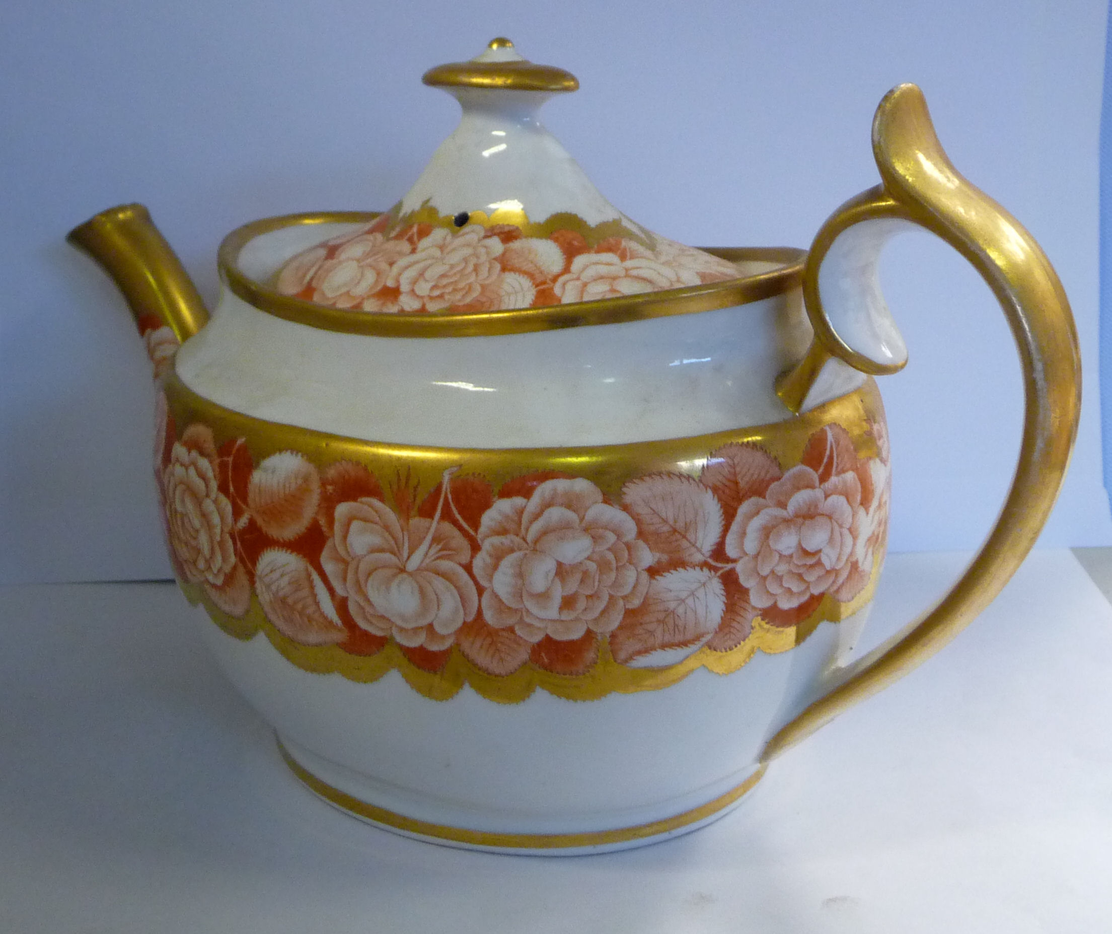 An early 19thC Spode china oval teapot and lid, decorated in sepia and ...