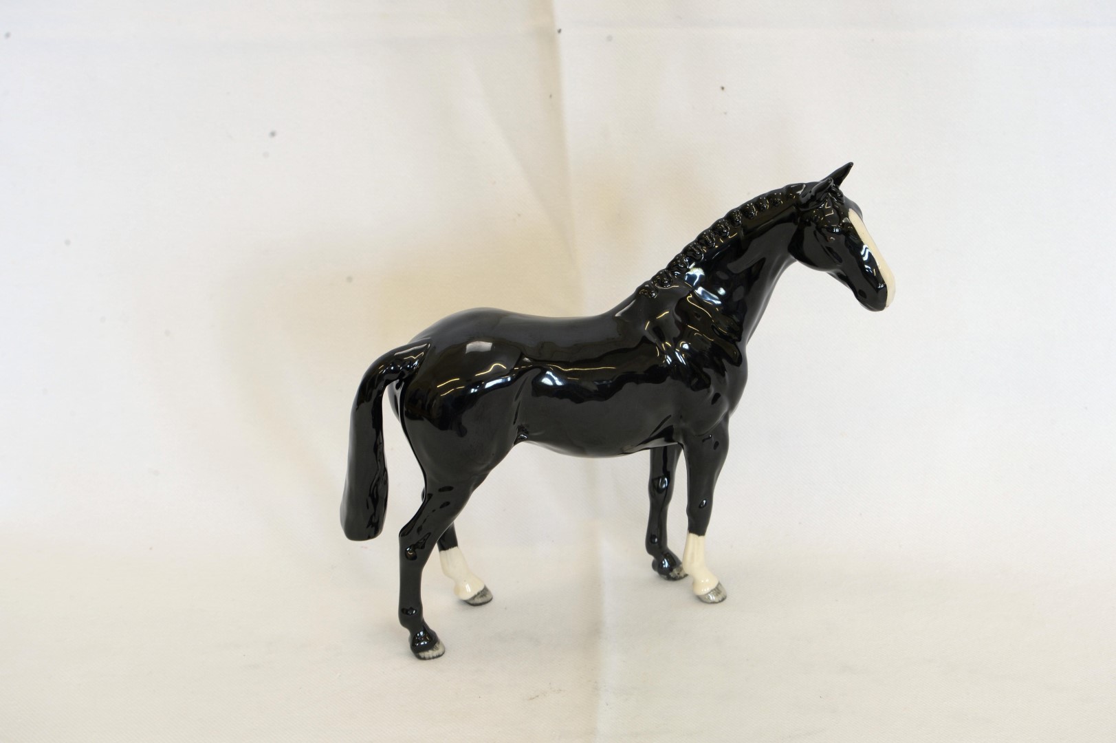 A Beswick black Hunter horse, model no H260. Issued in 2005 in a ...