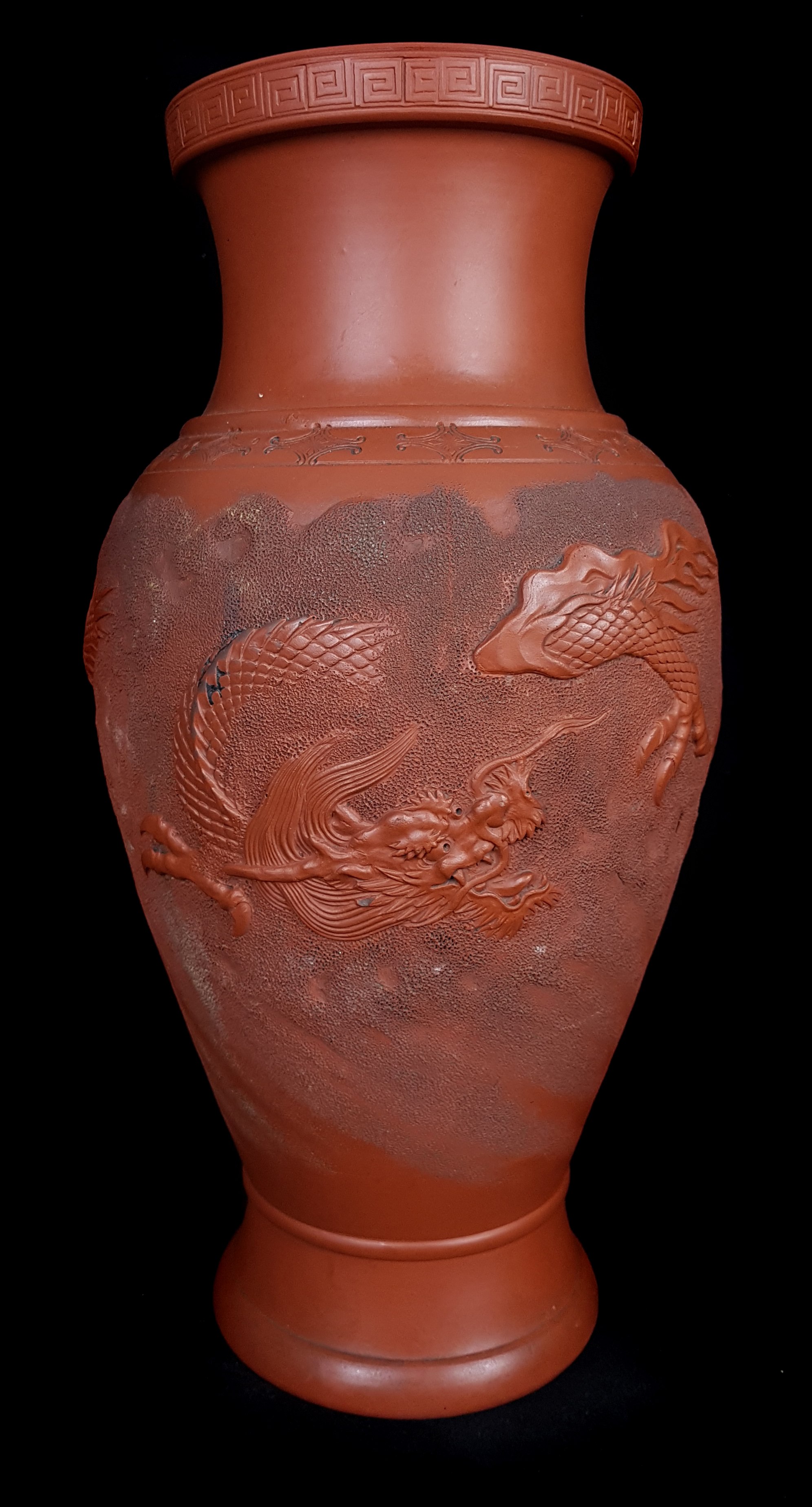 A Chinese Yixing redware pottery vase, baluster form, decorated with ...