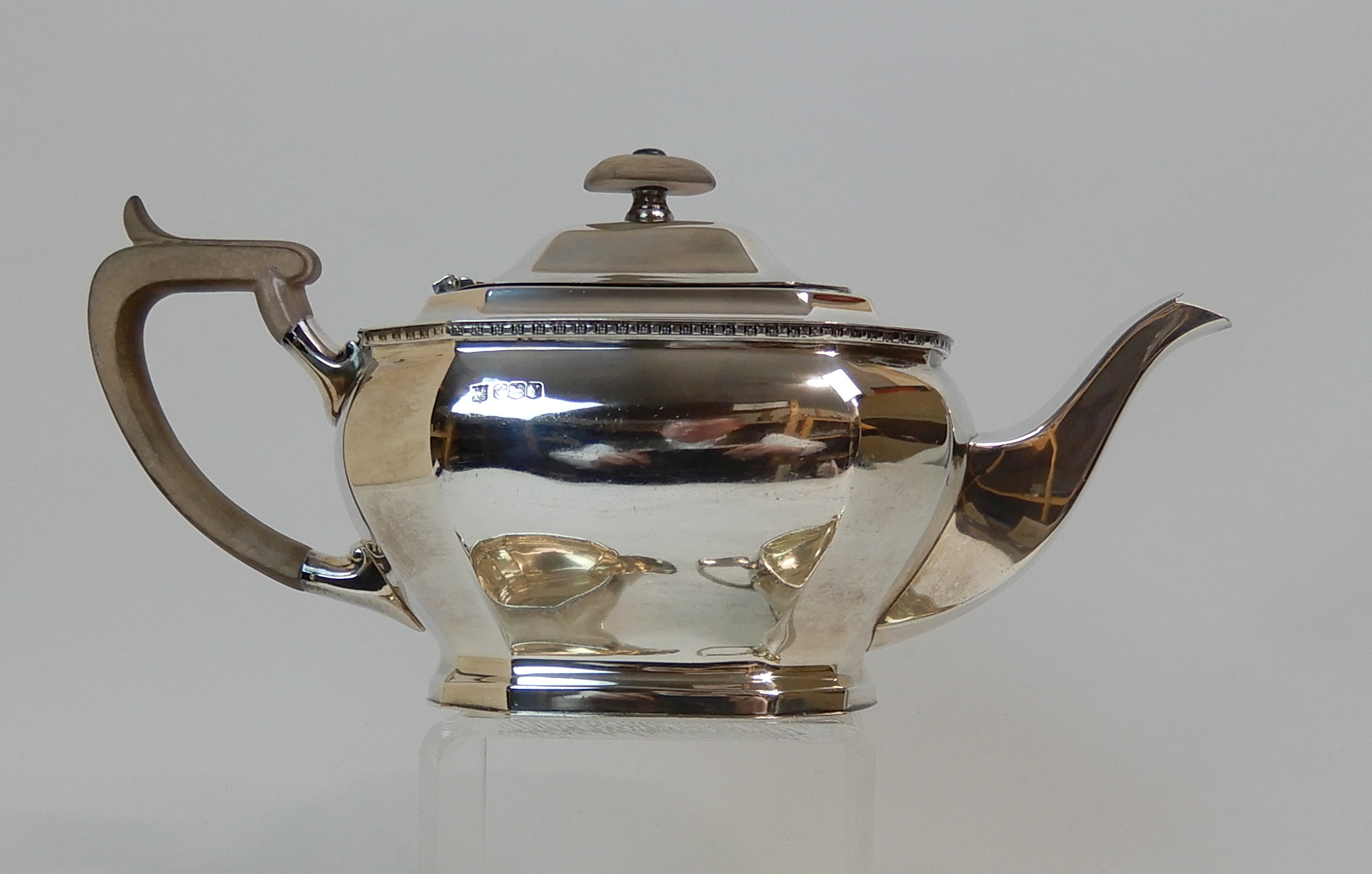 A THREE PIECE SILVER TEA SERVICE by Cooper Brothers & Sons Limited ...